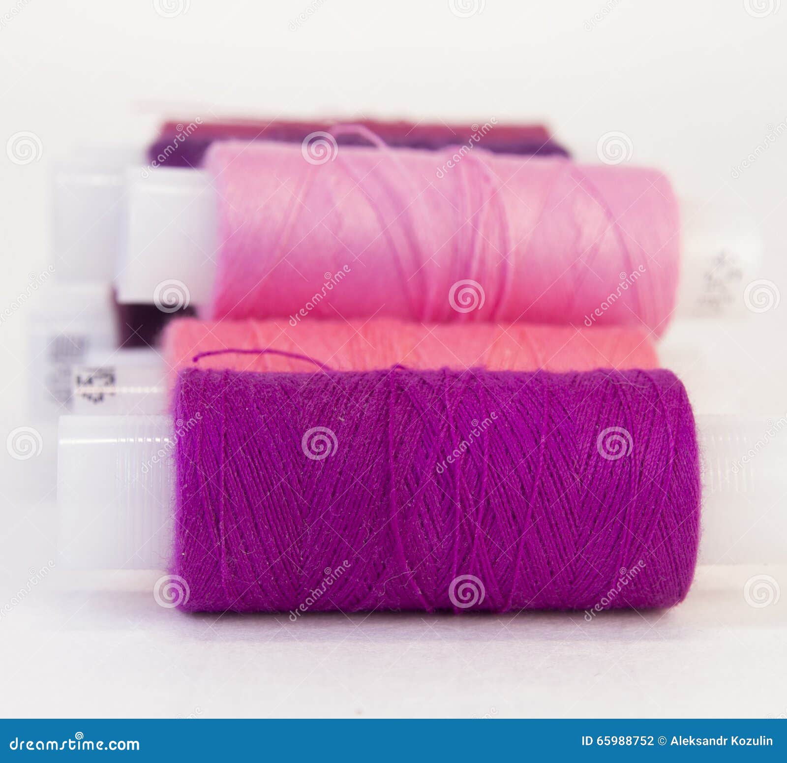 Colorful rolls of thread. stock photo. Image of rolls - 65988752