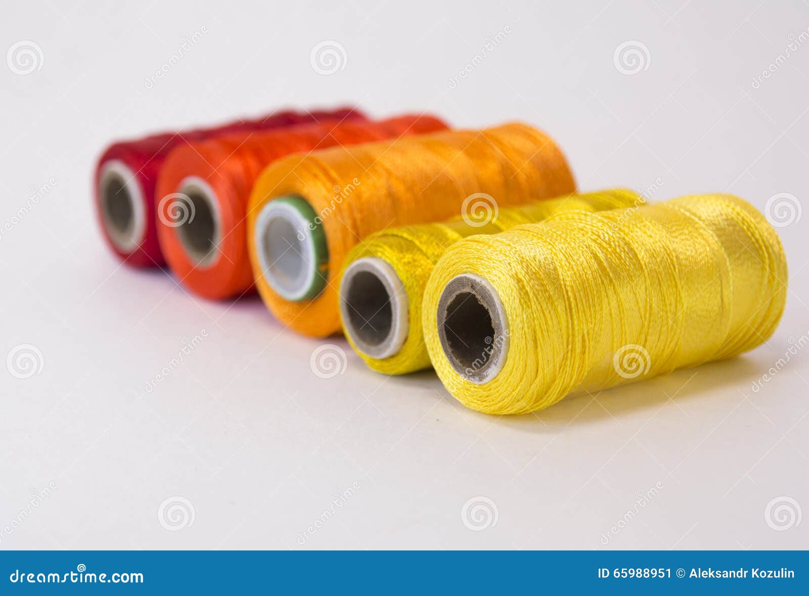 Colorful rolls of thread. stock image. Image of sewing - 65988951