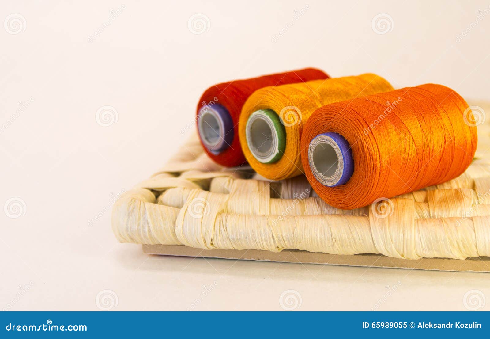 Colorful rolls of thread. stock image. Image of cmykcolors - 65989055