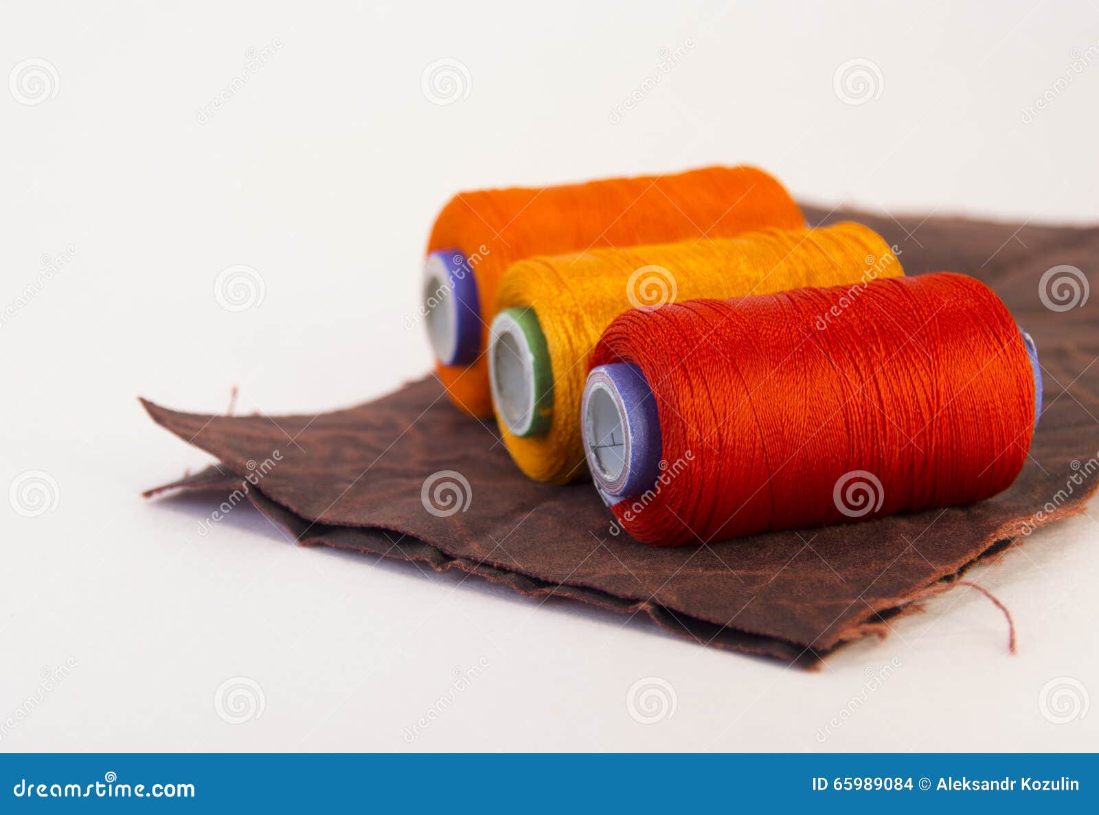 Colorful rolls of thread. stock photo. Image of green - 65989084