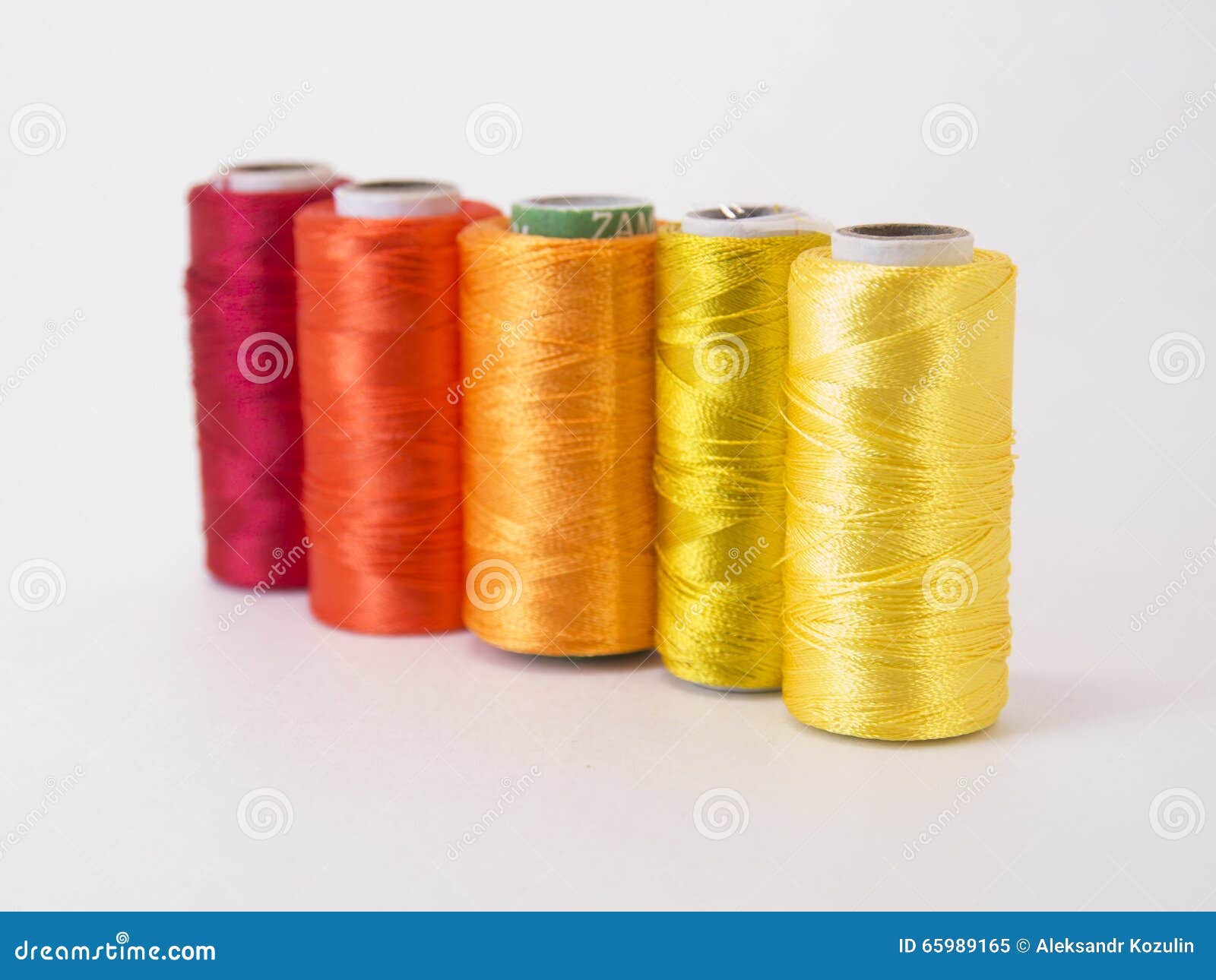 Colorful rolls of thread. stock image. Image of rainbow - 65989165