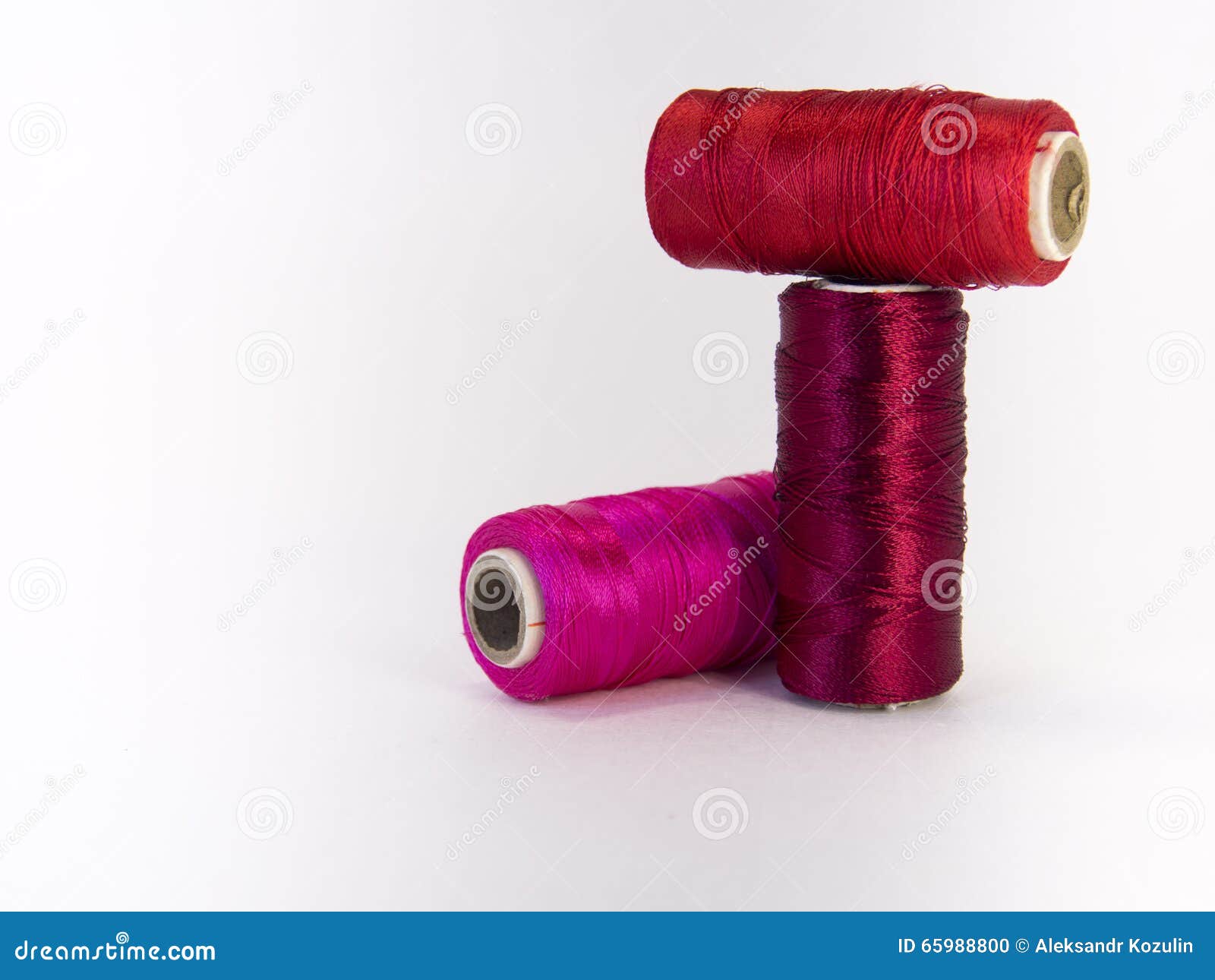 Colorful rolls of thread. stock photo. Image of sewing - 65988800