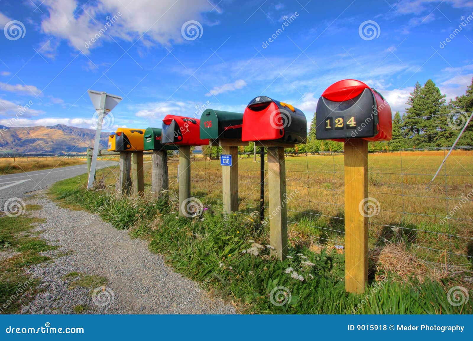 Colorful row of post boxes stock photo. Image of mailman - 9015918