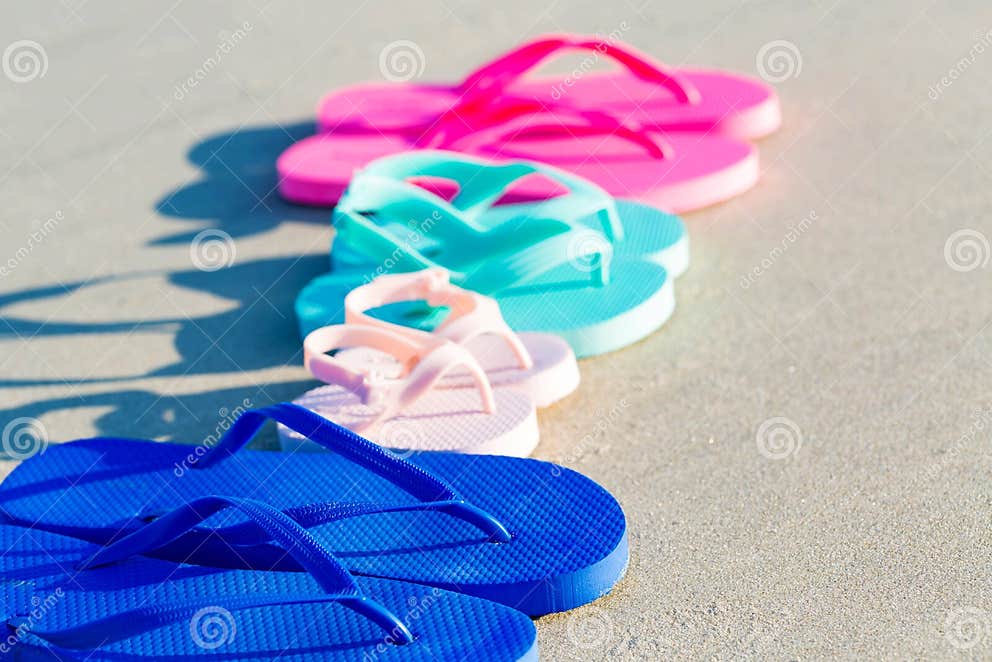 Colorful Sandals at the Beach Stock Photo - Image of beach, shoes: 94080948