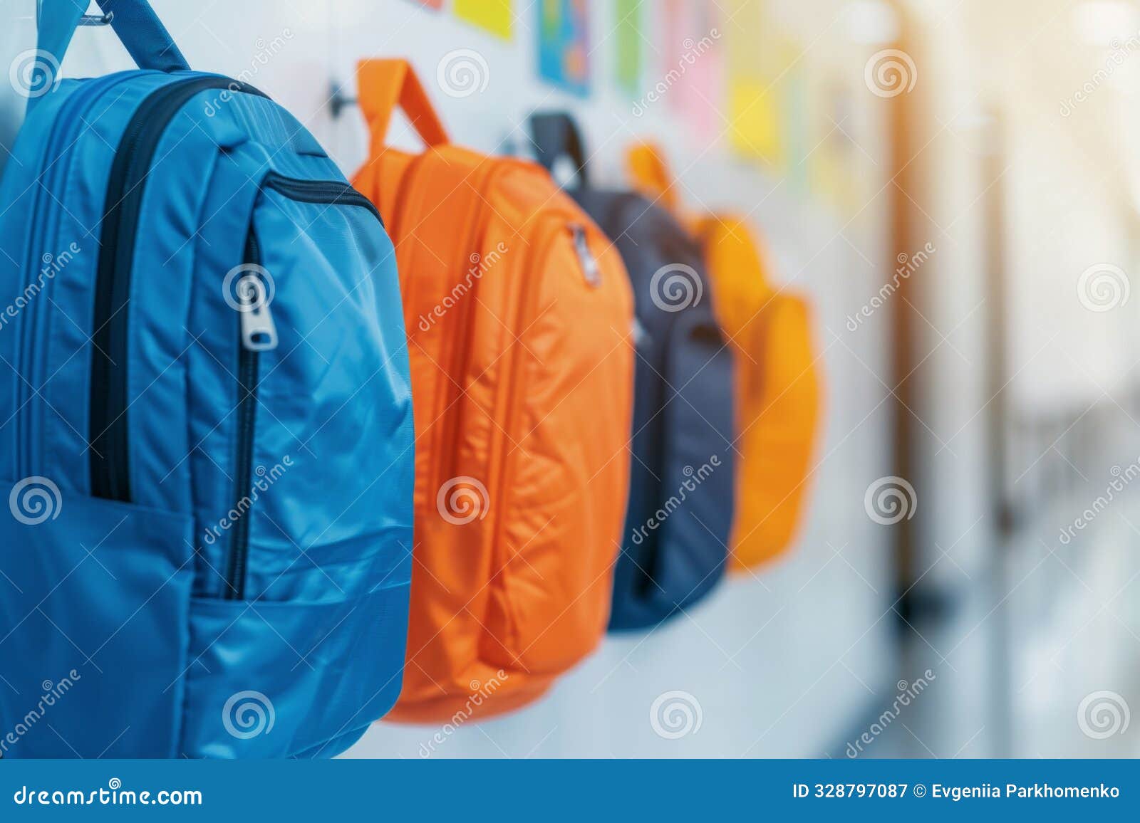 Colorful School Backpacks Hanging in Bright Classroom Setting Stock ...