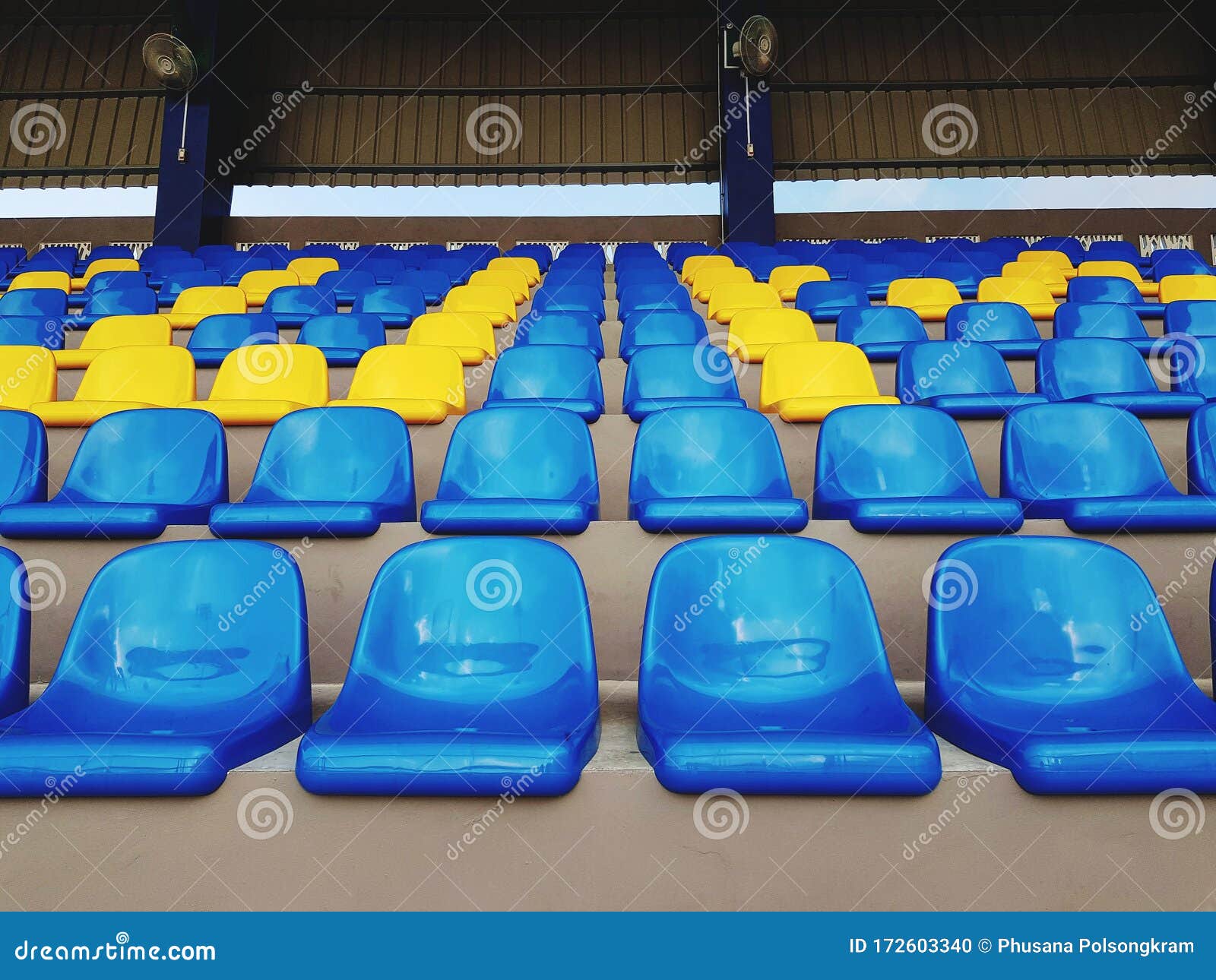Colorful seats at stadium stock photo. Image of fans - 172603340