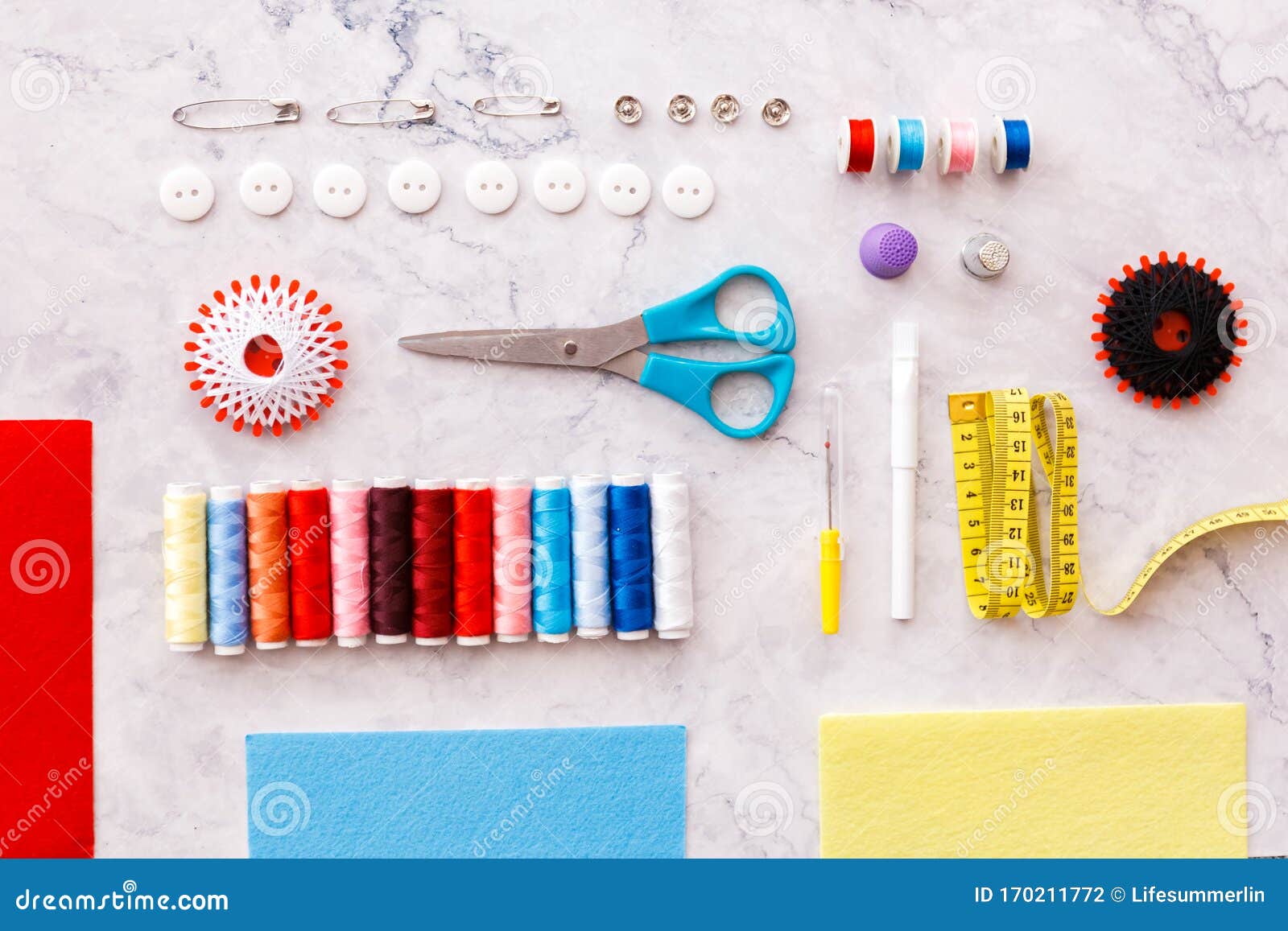 Colorful Sewing and Tailoring Tools and Items on Light Background Stock ...