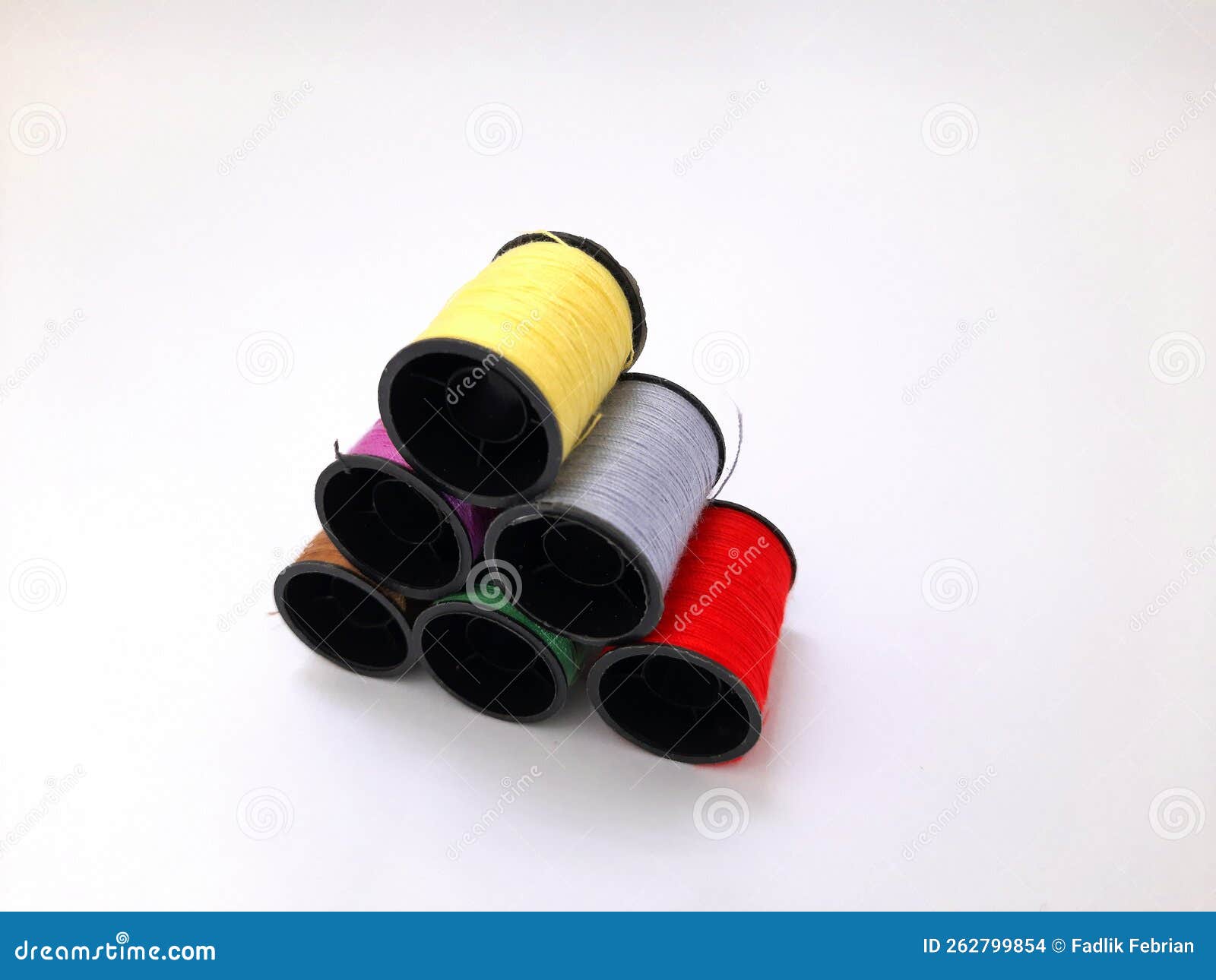 Colorful Sewing Thread Spools Stock Photo - Image of glasses ...