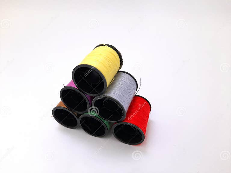 Colorful Sewing Thread Spools Stock Photo - Image of glasses ...