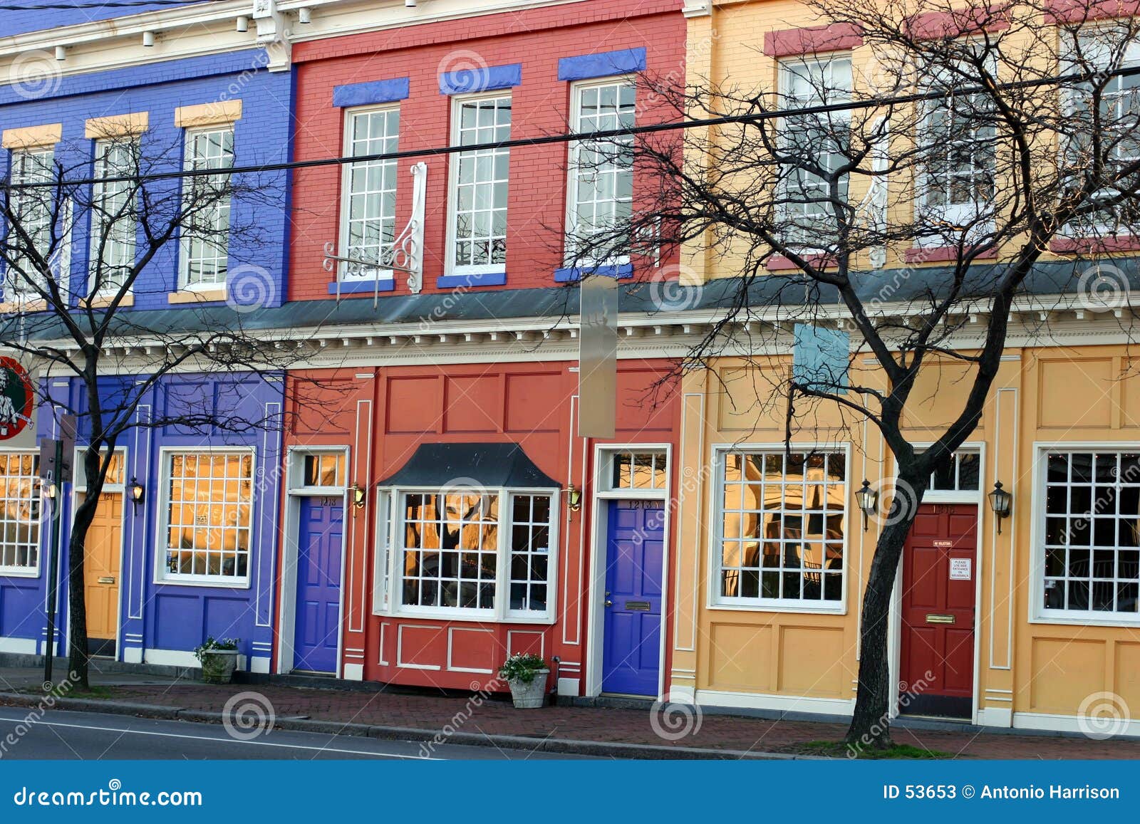 Colorful shops stock image. Image of tree, street, shops - 53653