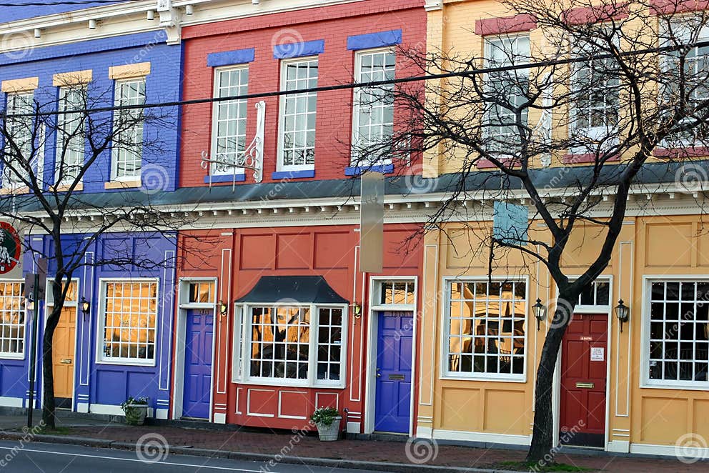 Colorful shops stock image. Image of tree, street, shops - 53653