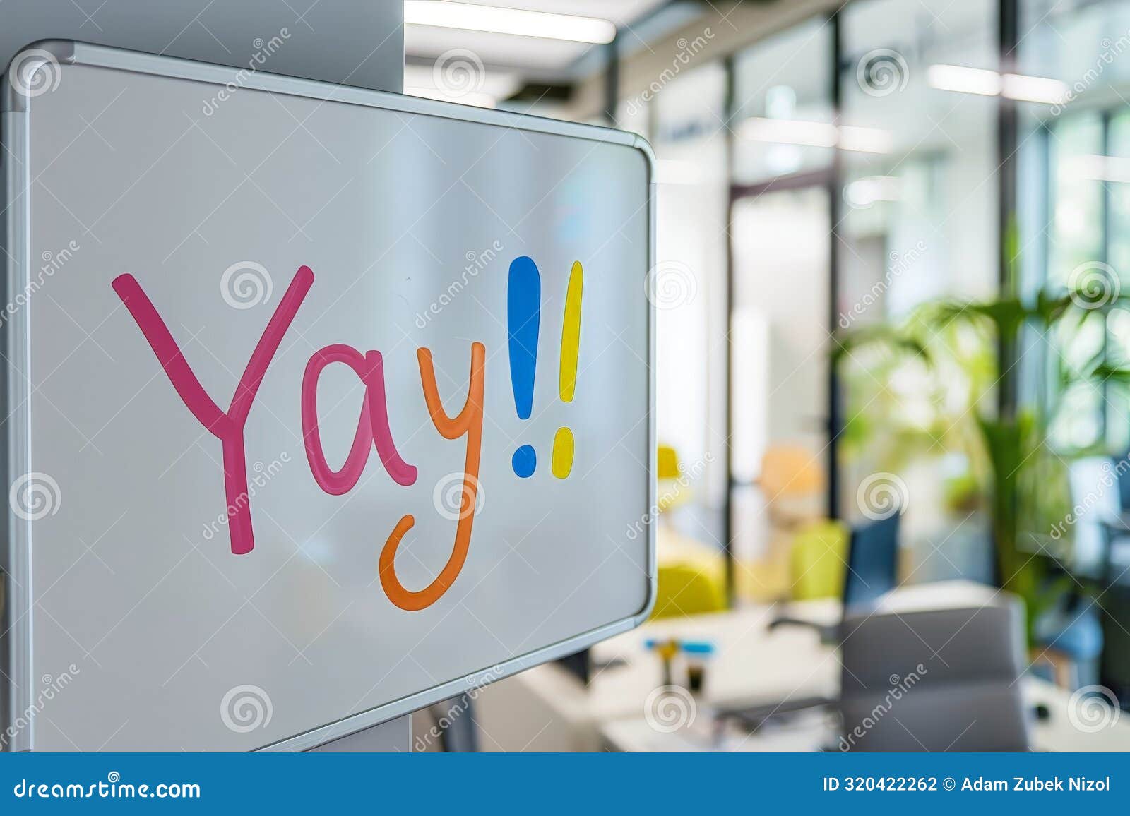 Colorful Sign with the Word Yay! in an Office Setting Stock ...