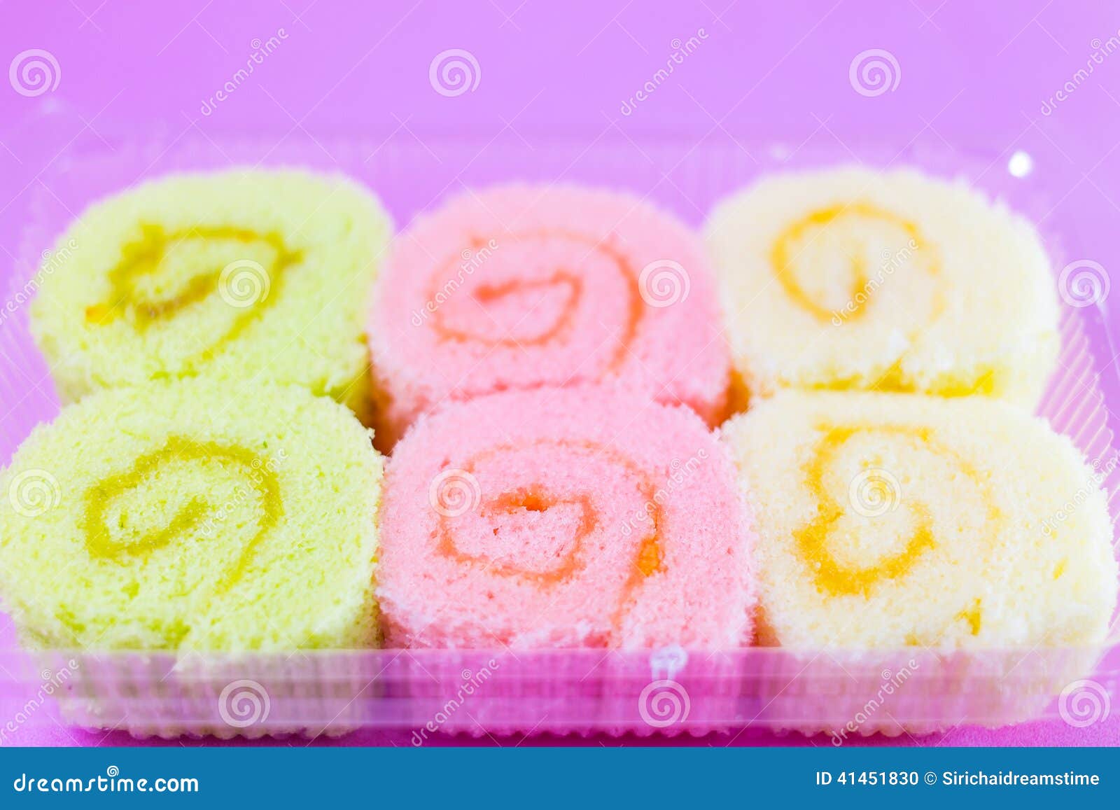 Colorful slice roll cake stock photo. Image of swirl - 41451830