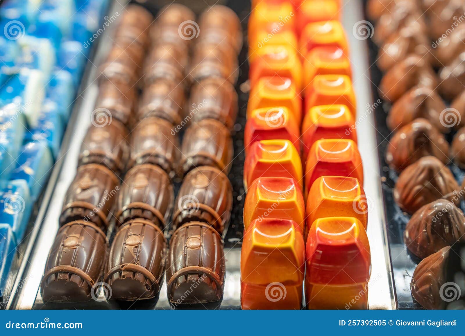 Colorful Small Chocolate Cakes in a Row Stock Image - Image of ...