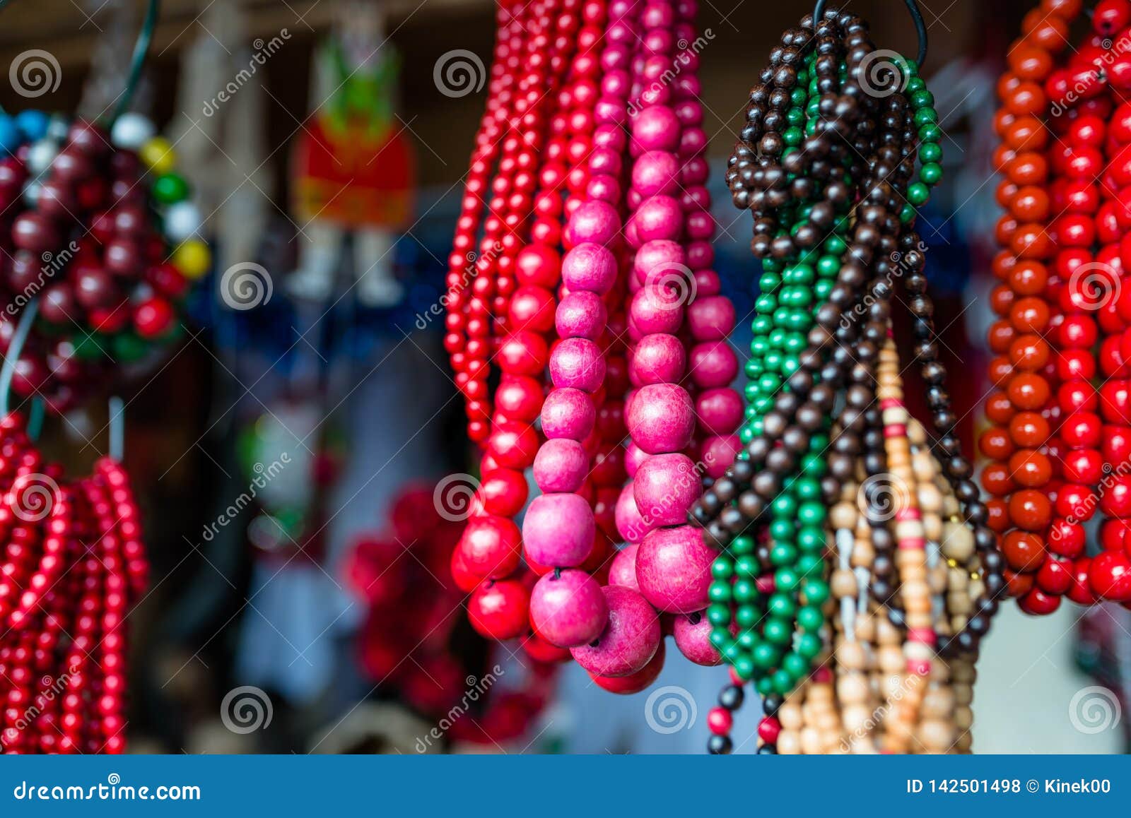 Colorful Small and Large Beads on a String Hang at the City Fair. Stock ...