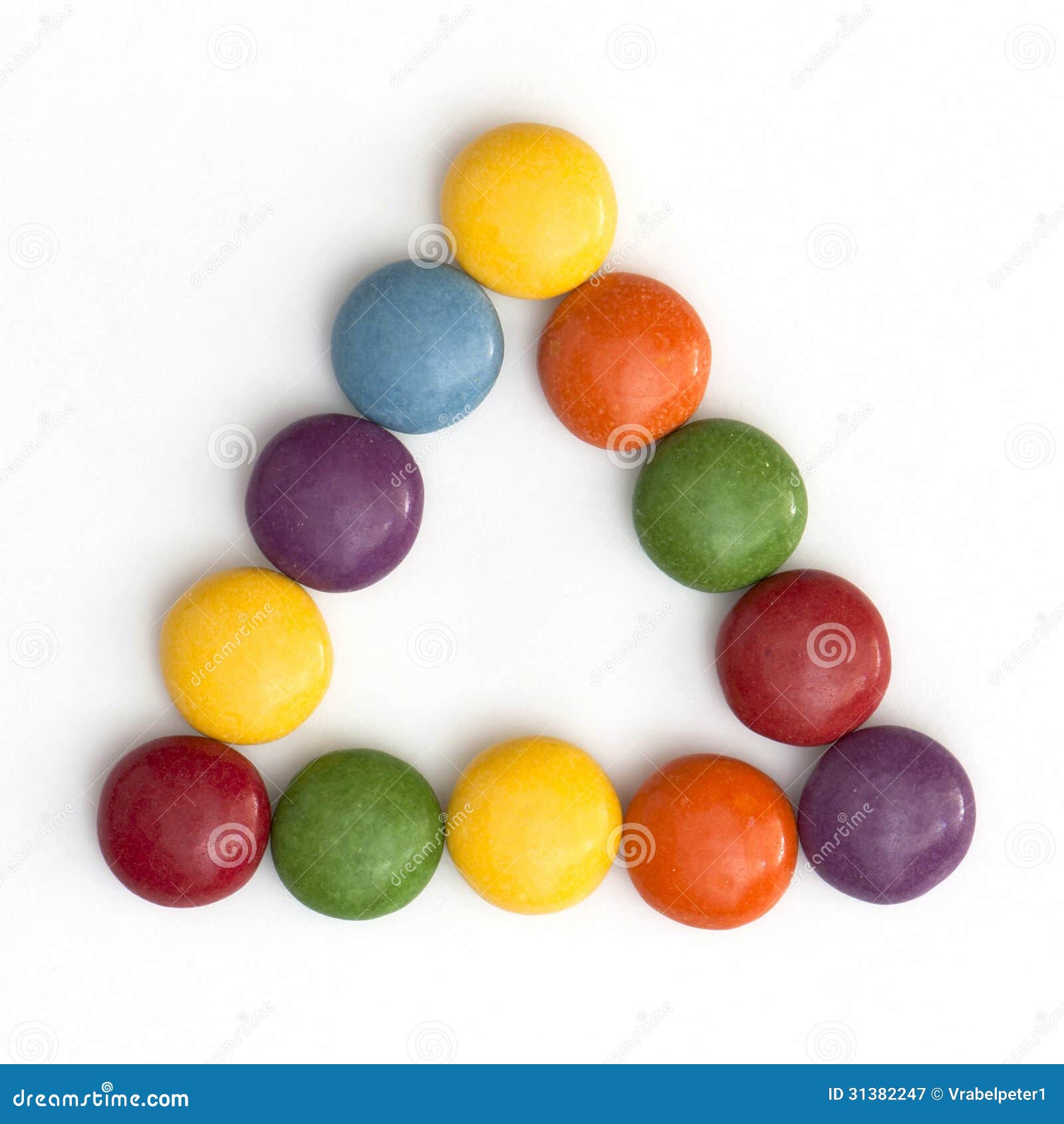 Colorful Smarties in a Triangle Stock Image - Image of setsquare, color ...