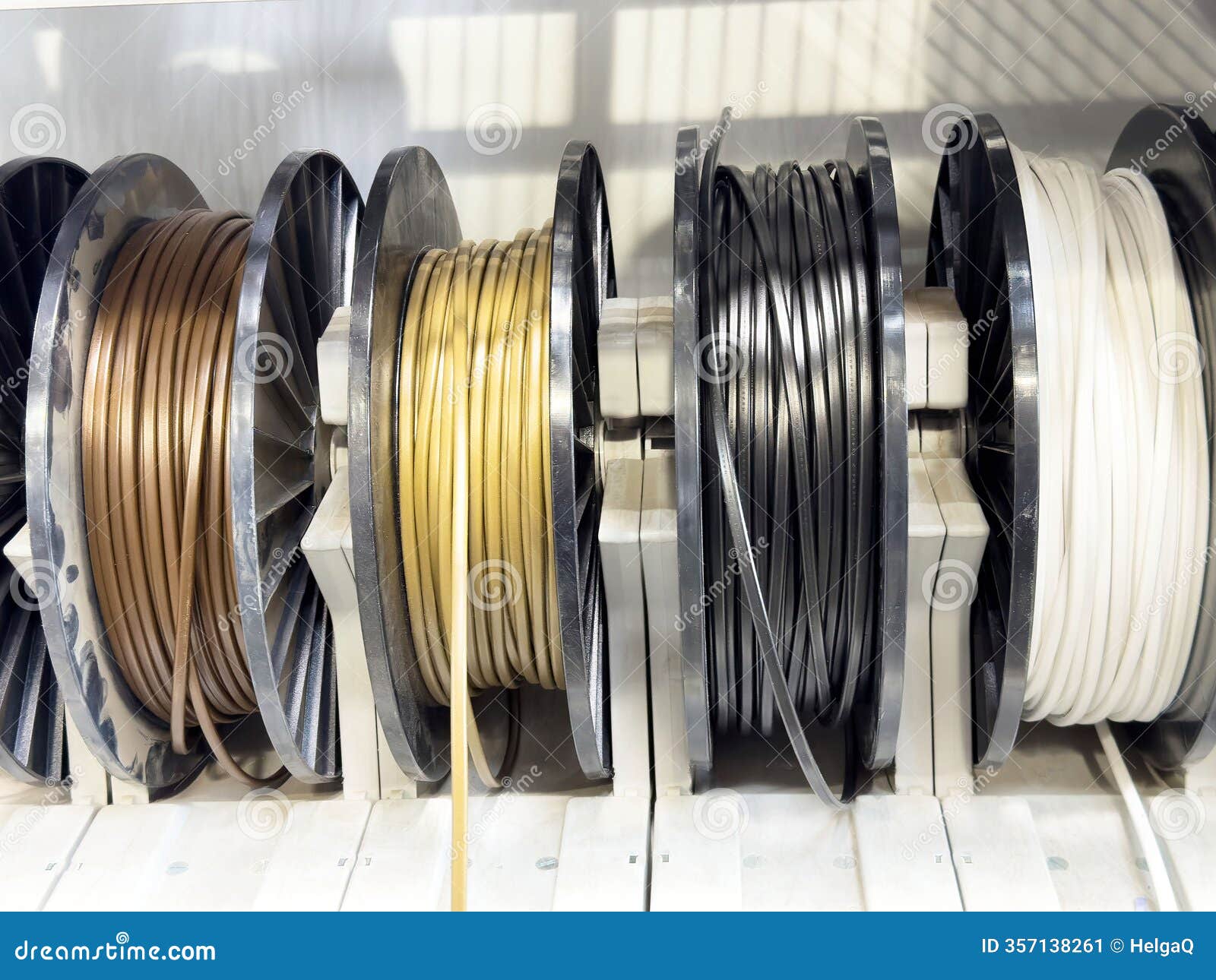 Colorful Spools of Electrical Cable on Metal Reels in Industrial ...