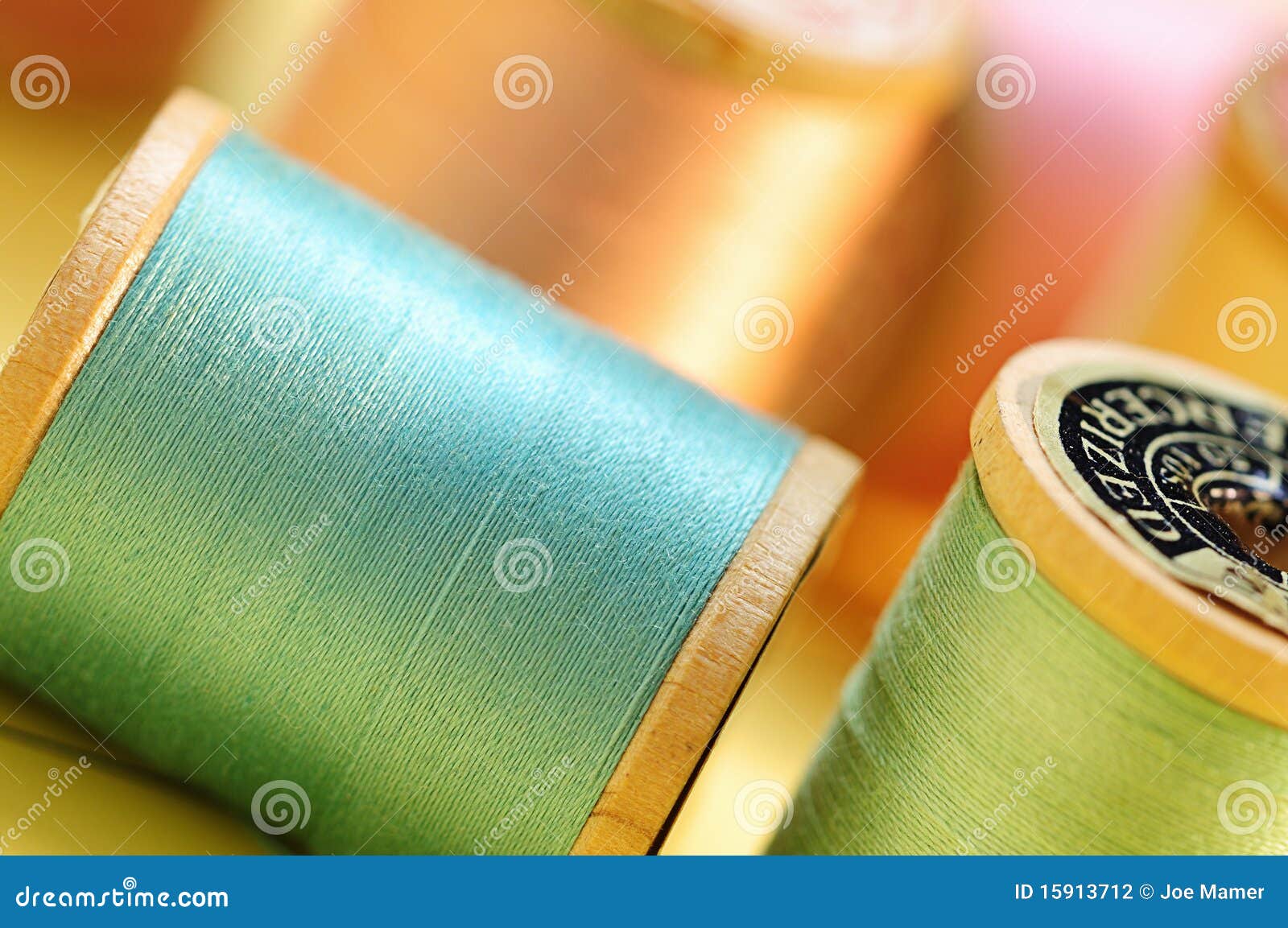 Colorful Spools of Pastel Colored Thread Stock Photo - Image of yellow ...