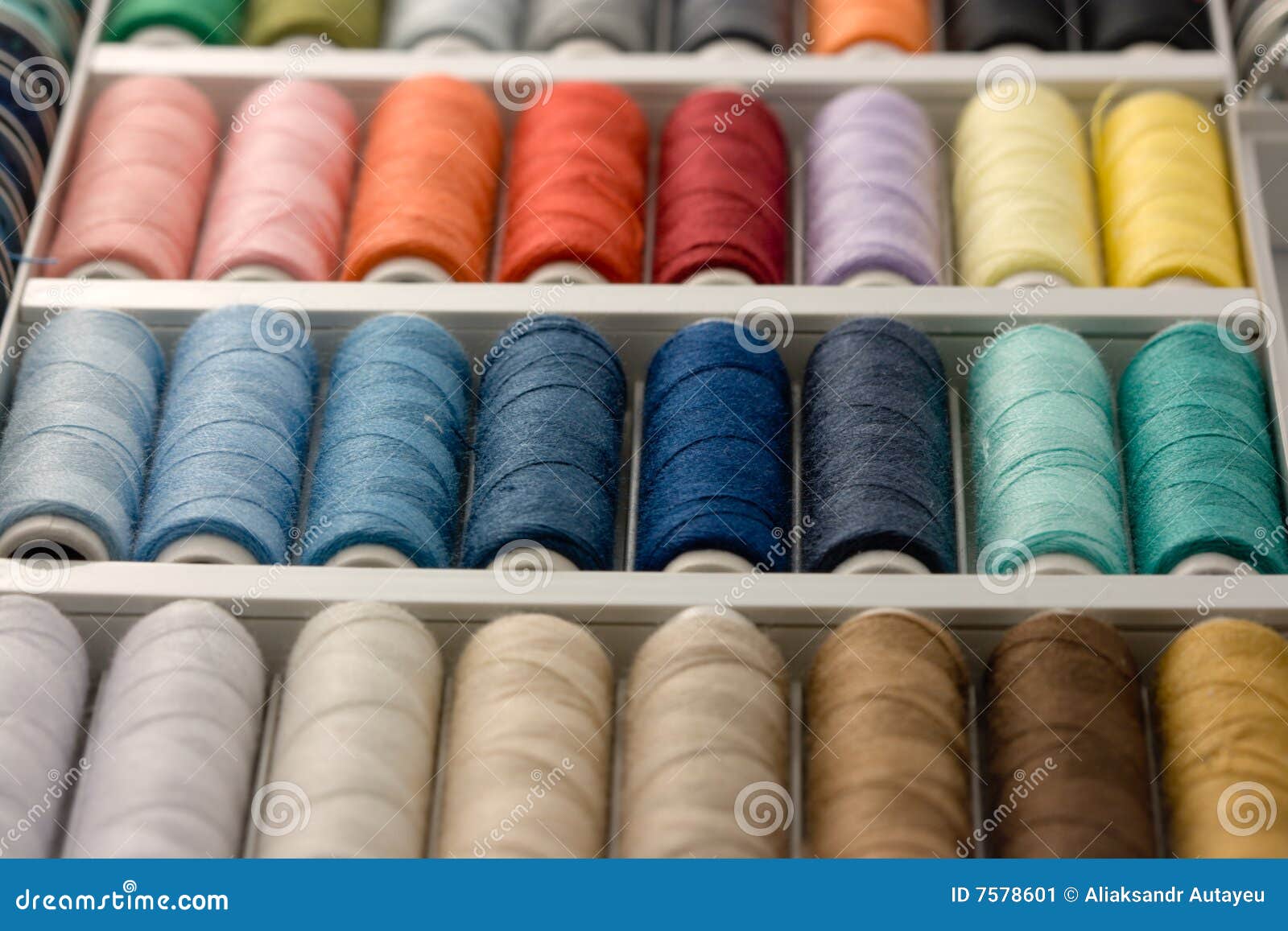 Colorful spools of thread stock image. Image of supplies - 7578601