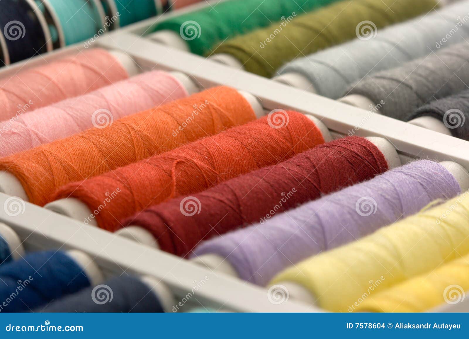 Colorful spools of thread stock photo. Image of supplies - 7578604
