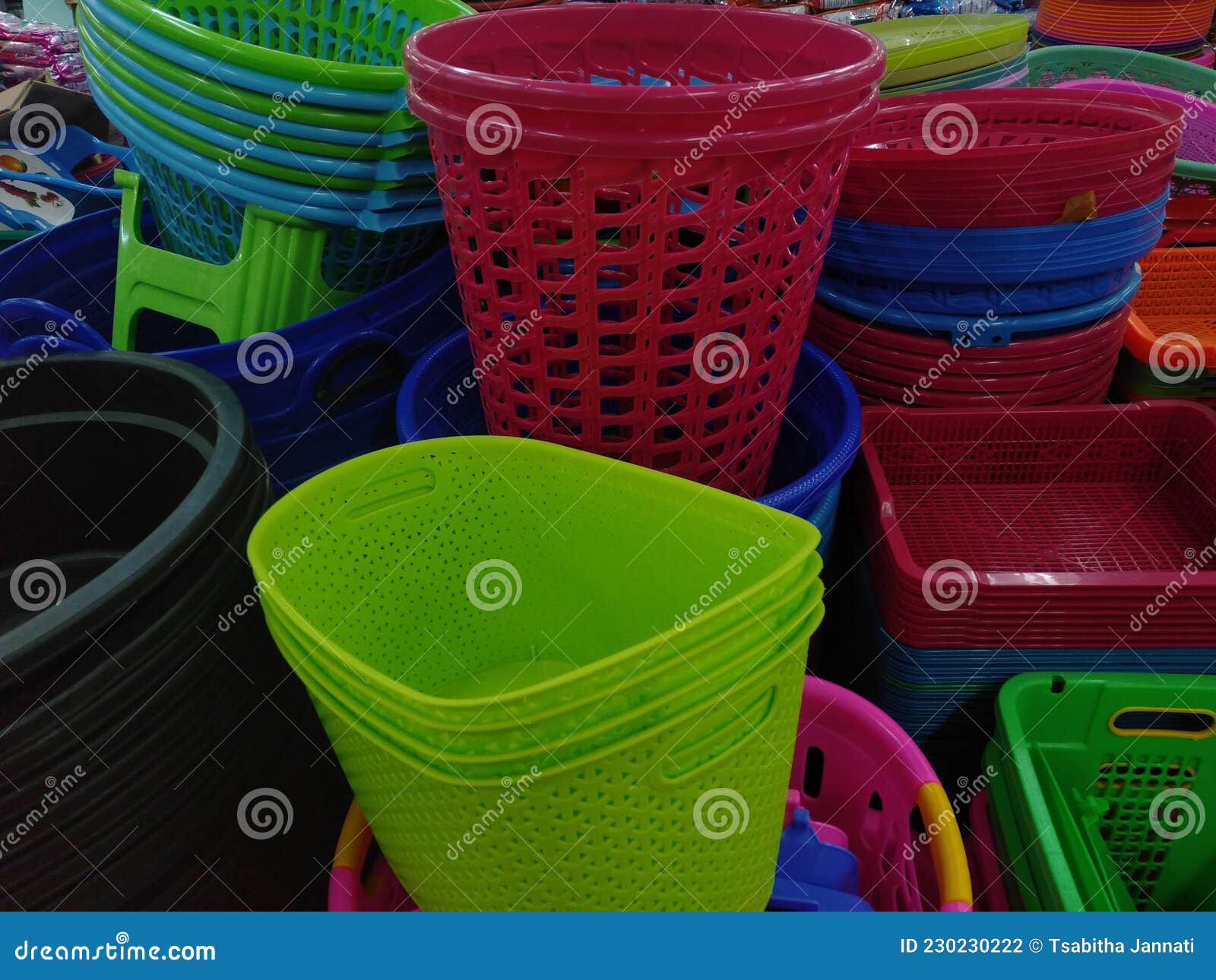 Colorful Stack of Baskets and Buckets for Sell in the Supermarket Stock ...