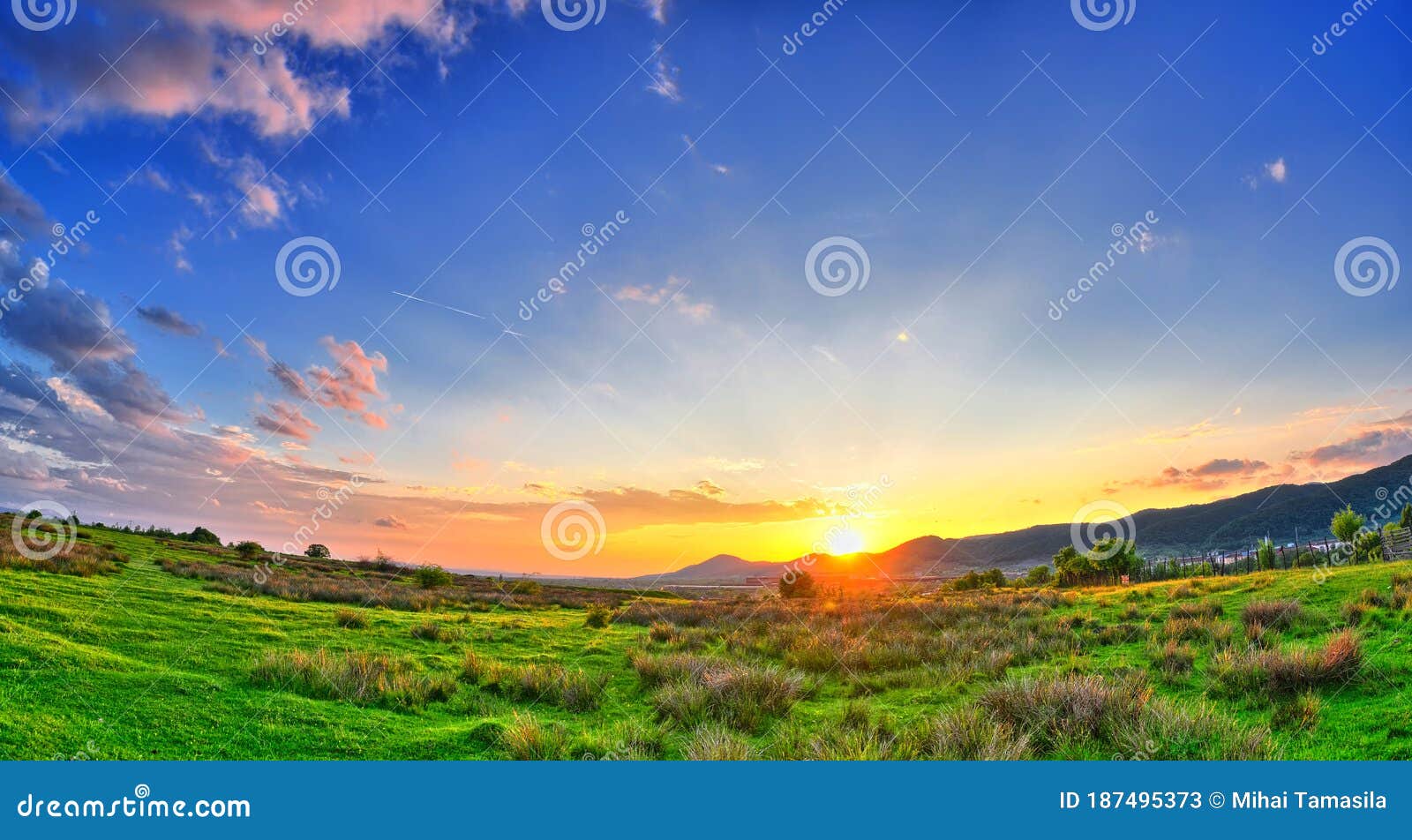Colorful Summer Sunset with Sun Rays Coloring the Clouds Stock Image ...