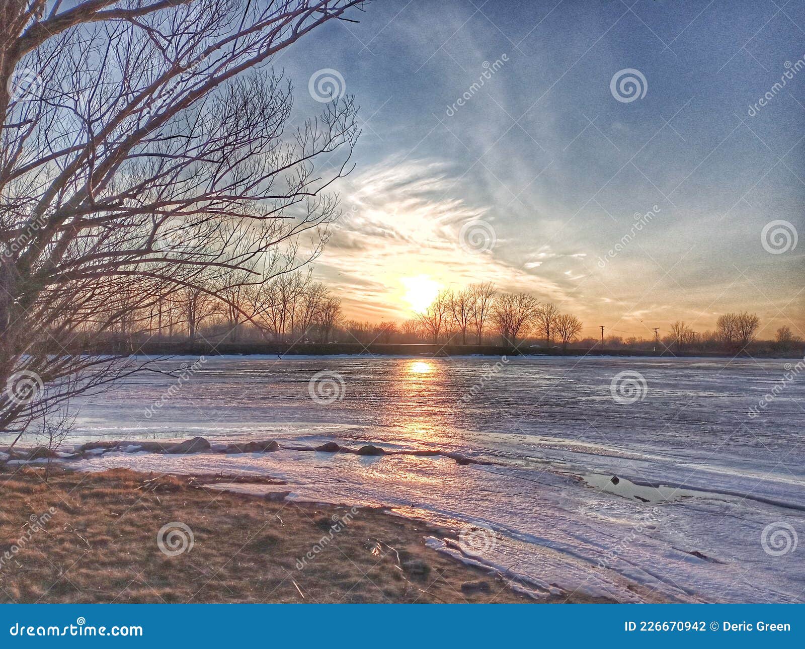 Colorful sunset on ice stock photo. Image of snow, tree - 226670942