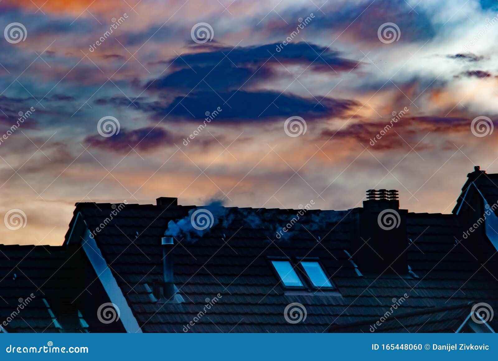 Colorful Sunset and Rooftops Stock Photo - Image of house, roof: 165448060