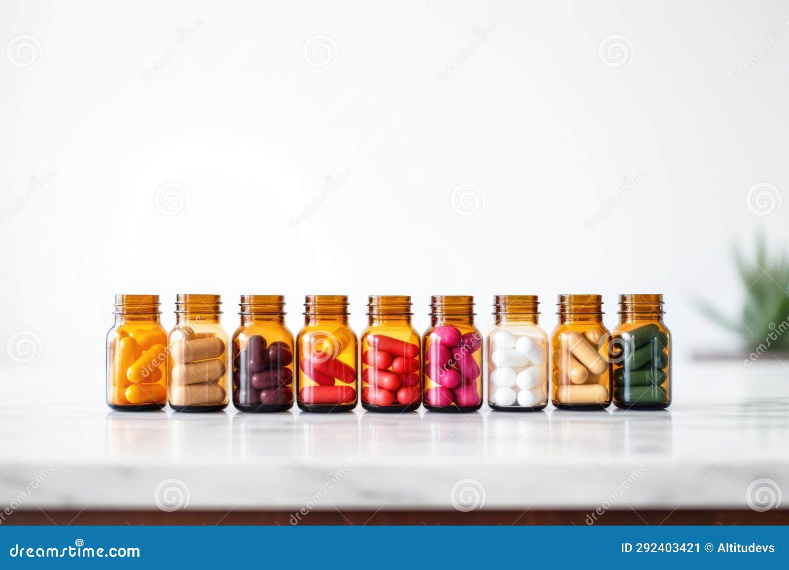 Colorful Supplement Bottles Lined Up on White Countertop Stock Image ...