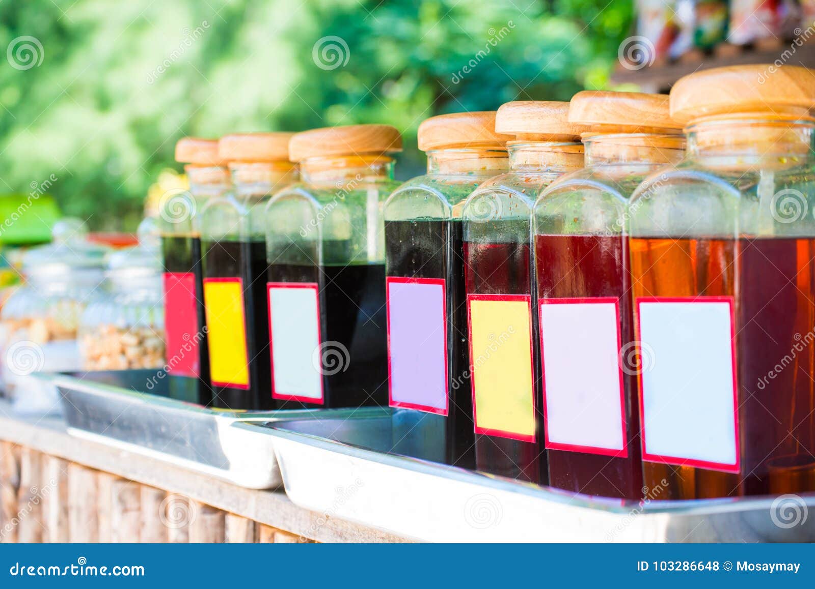 Colorful Sweet Syrup in Glass Bottles Stock Photo - Image of liquid ...