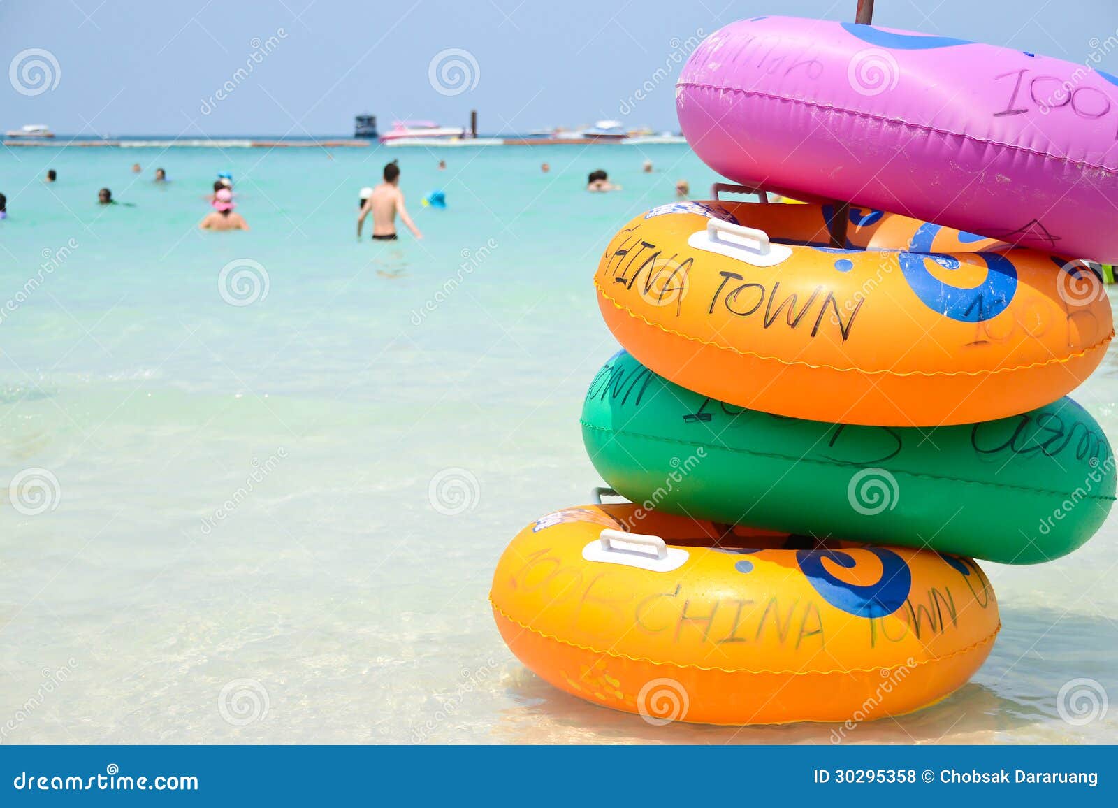 The colorful swim ring stock photo. Image of ocean, purple - 30295358