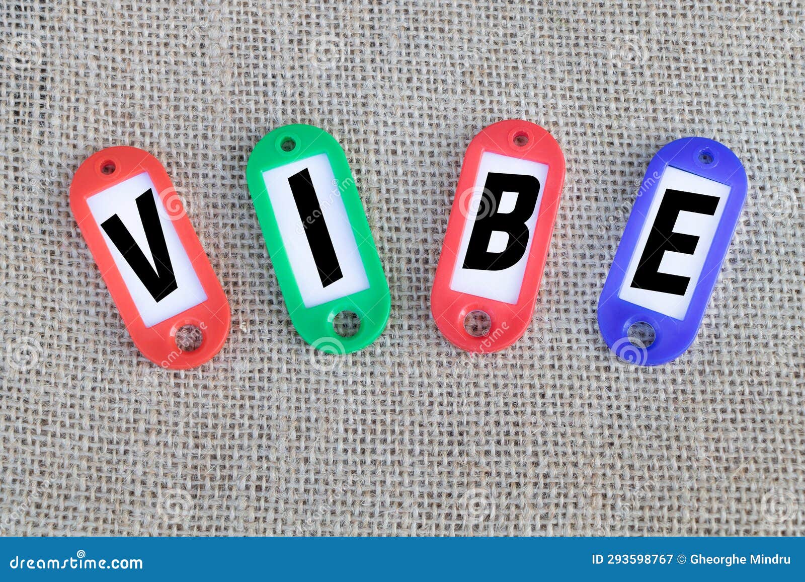 Colorful Tags with the Word VIBE on Burlap Background Stock Image ...