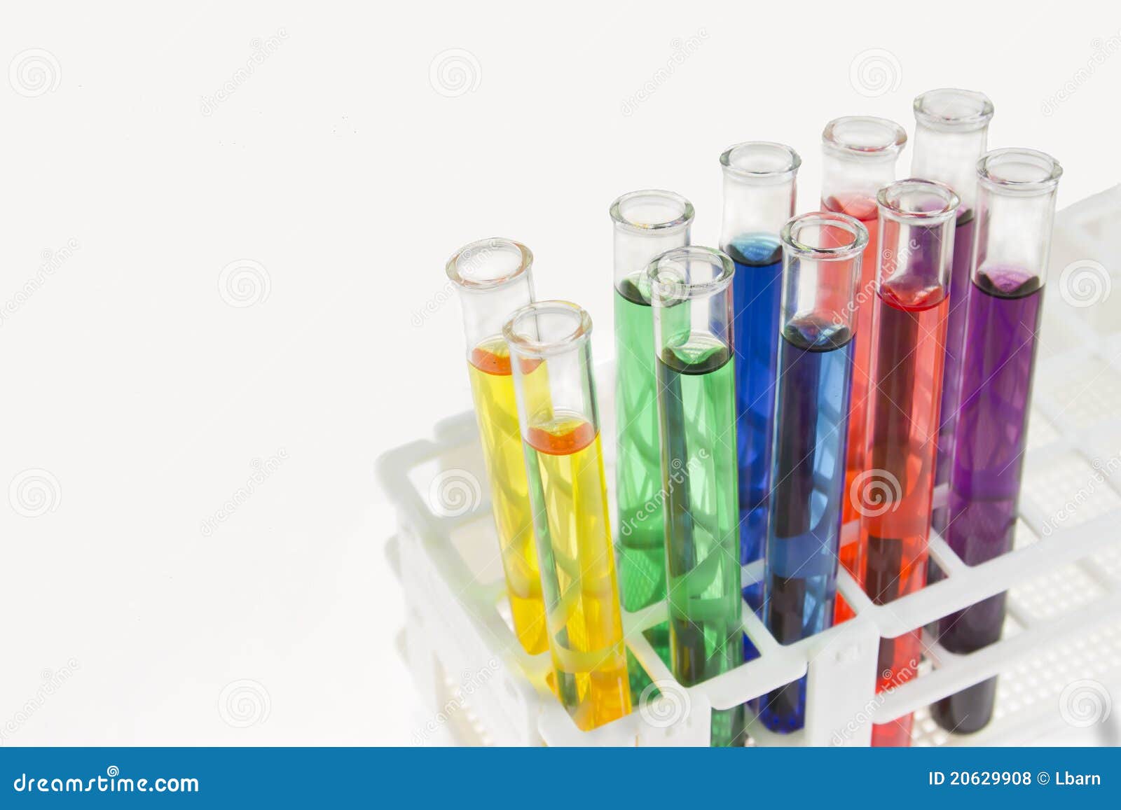 Colorful test tubs in rack stock photo. Image of test - 20629908