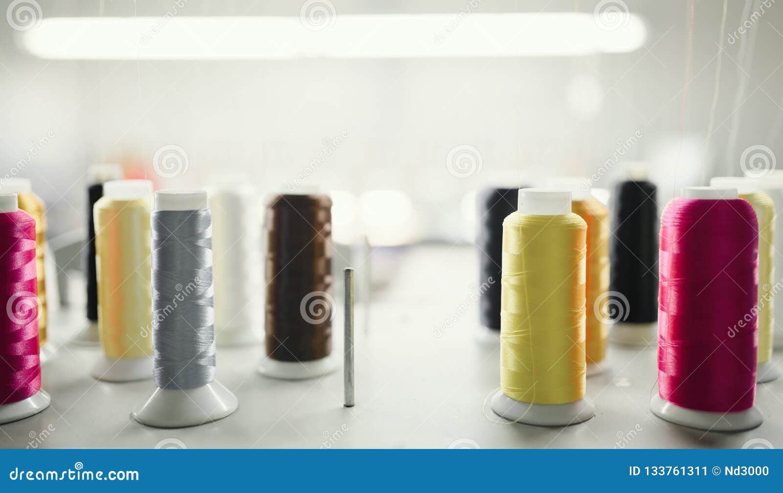 Thread Spools in Fabric Industry Stock Image - Image of fiber, green ...