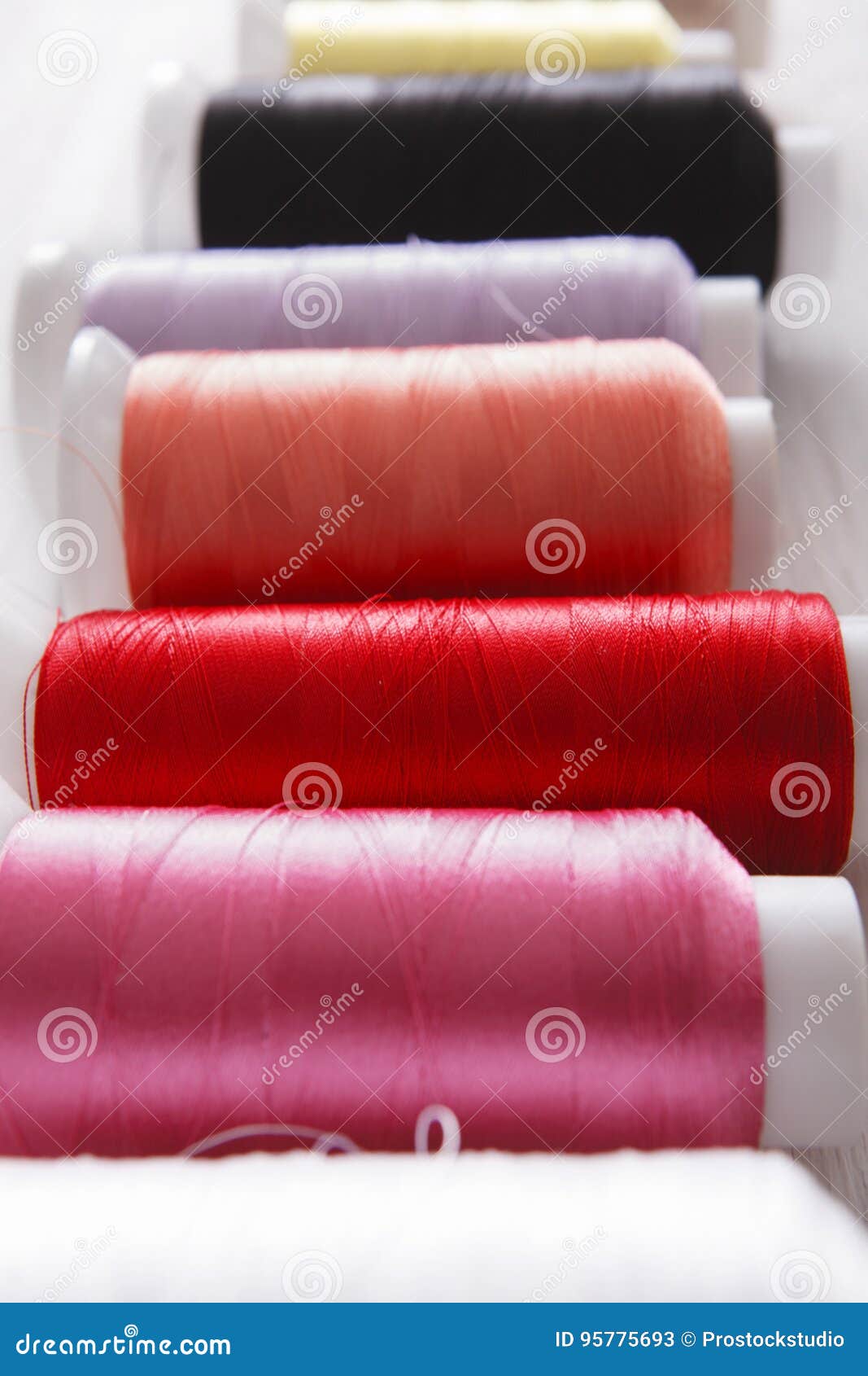Colorful Thread Spools on Wooden Table Close Up Stock Image - Image of ...