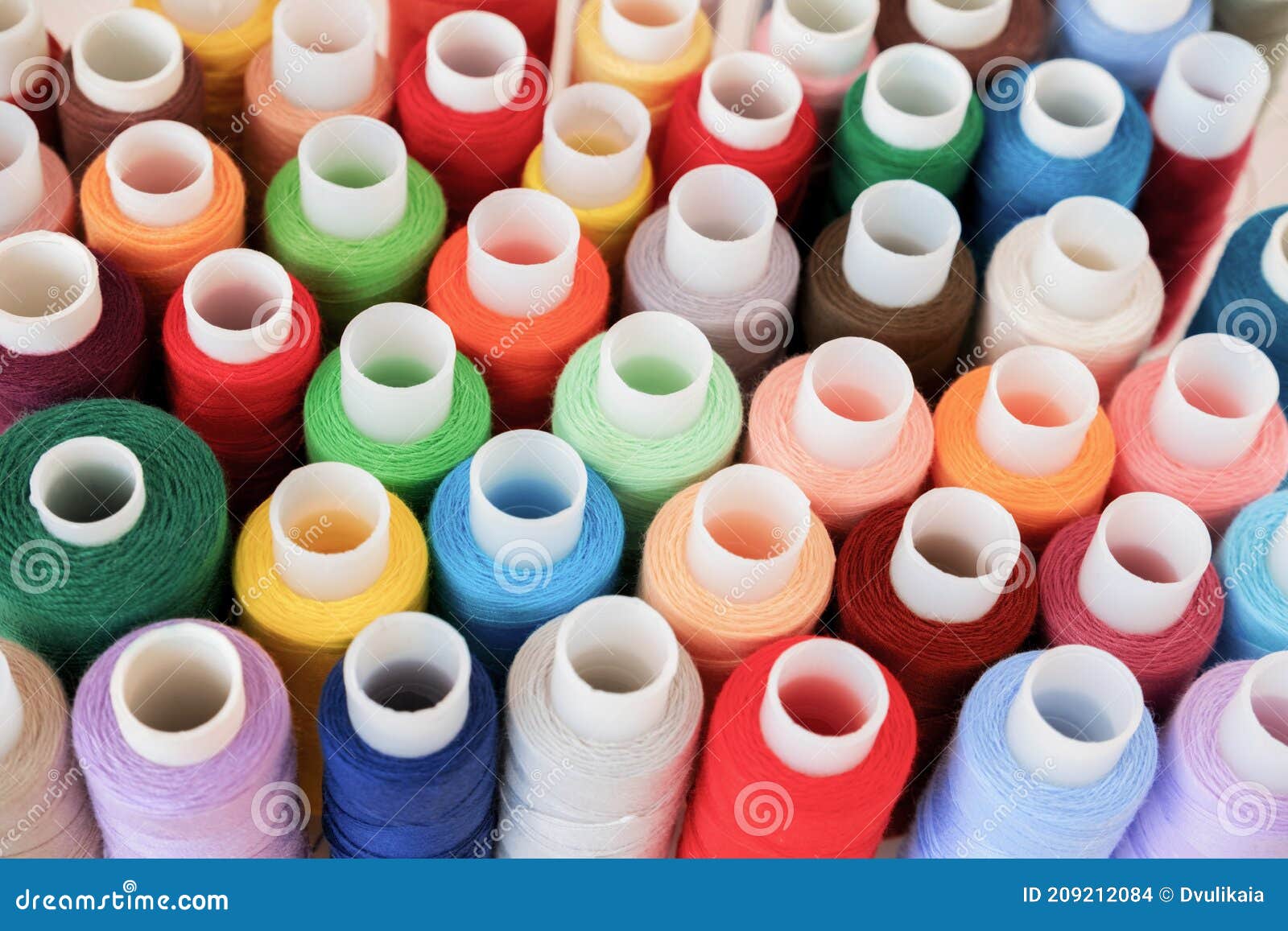 Colorful Threads on Spool Close-up. Handmade and Sewing Wallpaper Stock ...