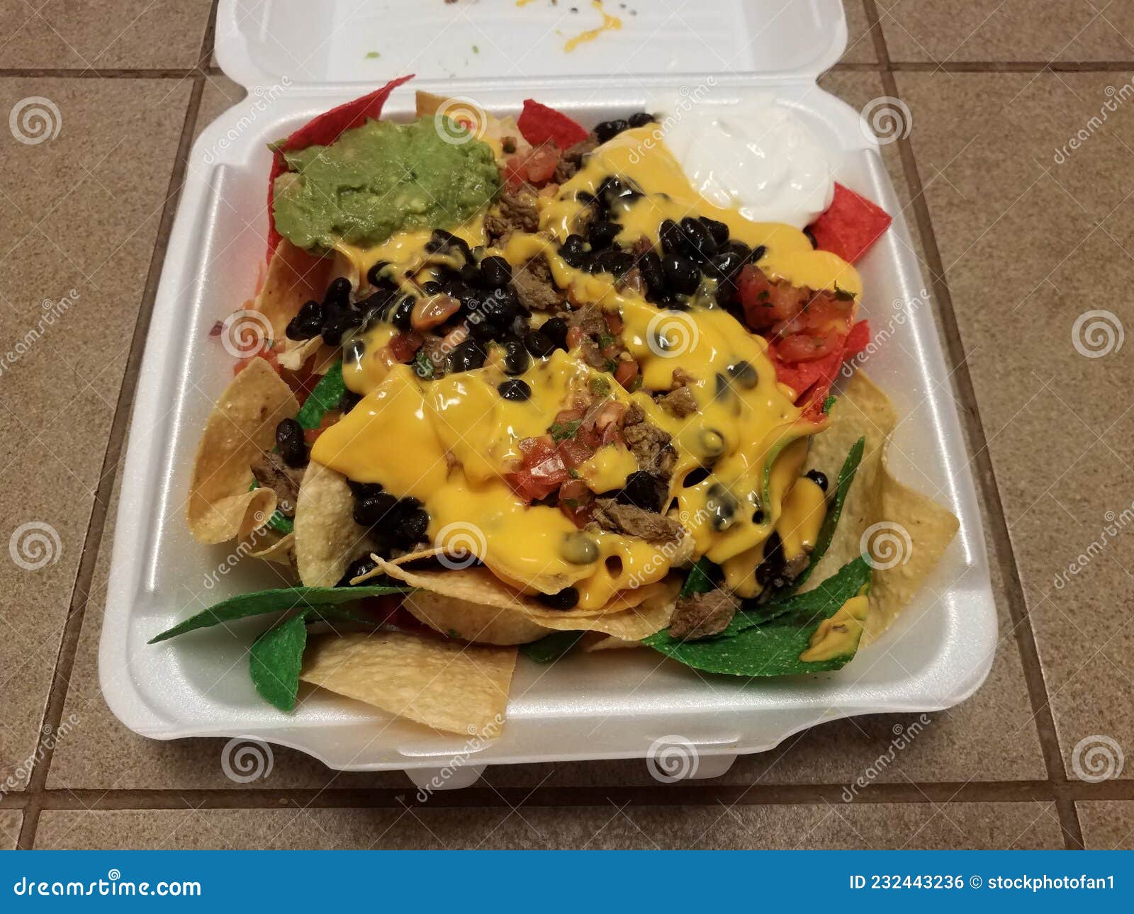 Colorful Tortilla Chips with Cheese and Beans in Box Stock Photo ...