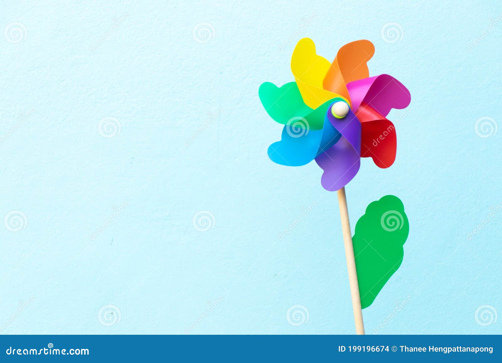 Color Toy Plastic Turbine Windmill on Blue Background Stock Photo ...
