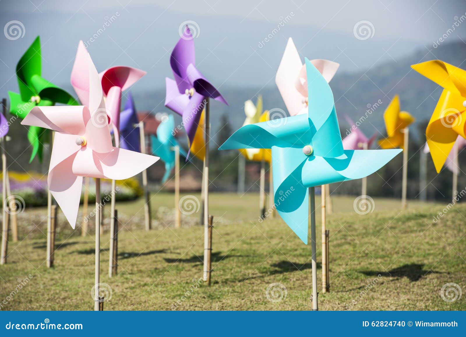 Colorful toy windmill stock photo. Image of nature, abstract - 62824740