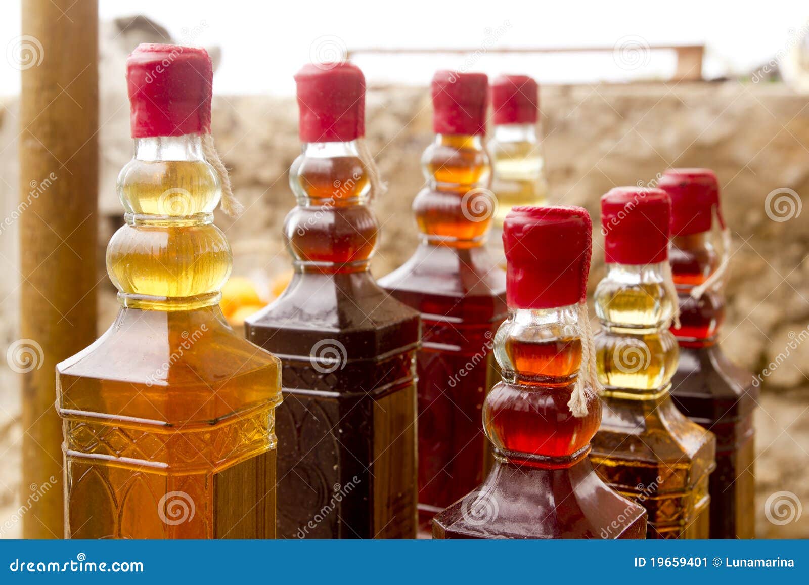 Colorful Traditional Liquor Bottles in Rows Stock Image - Image of ...