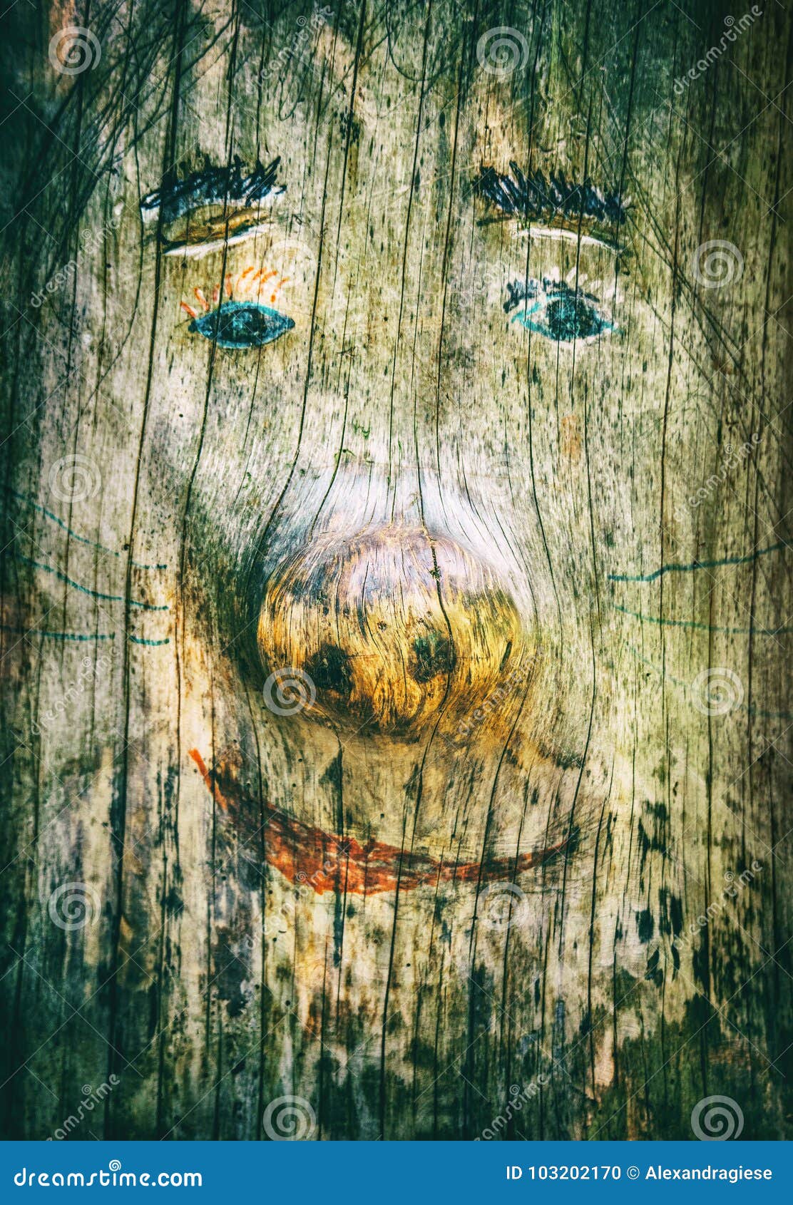 Colorful tree trunk face stock photo. Image of cartoon - 103202170