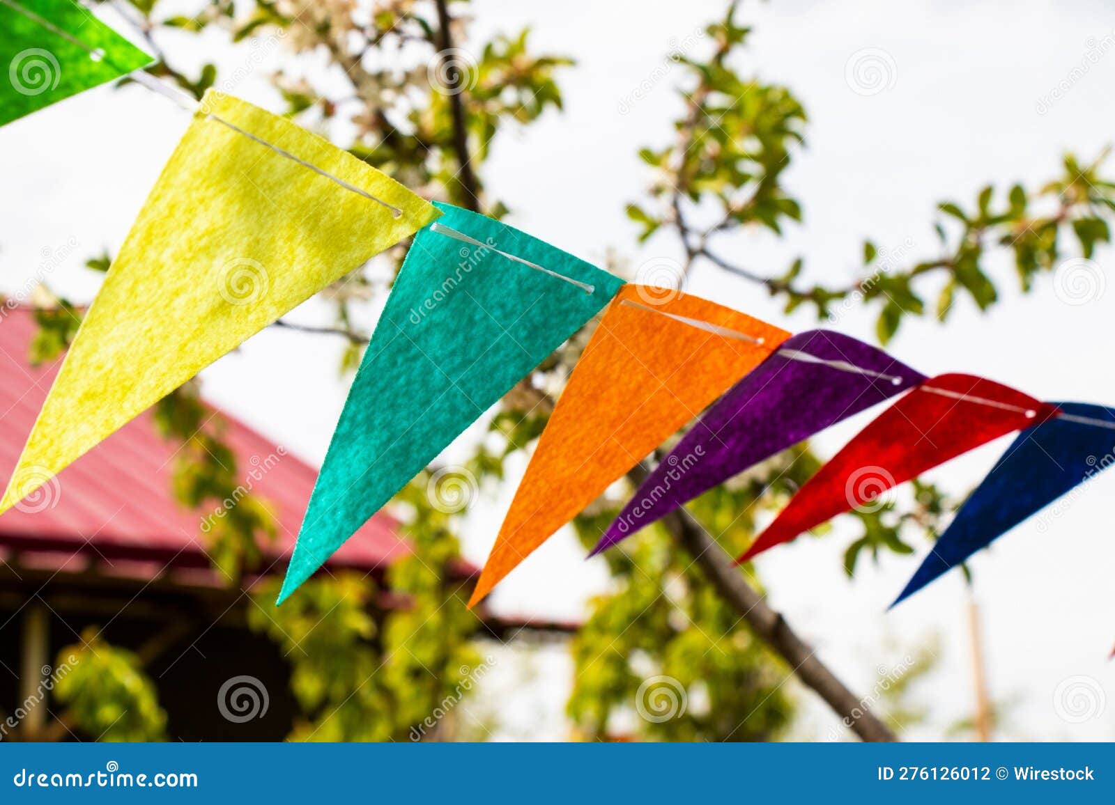 Colorful Triangle Flags Hanging on a Rope Stock Photo - Image of ...