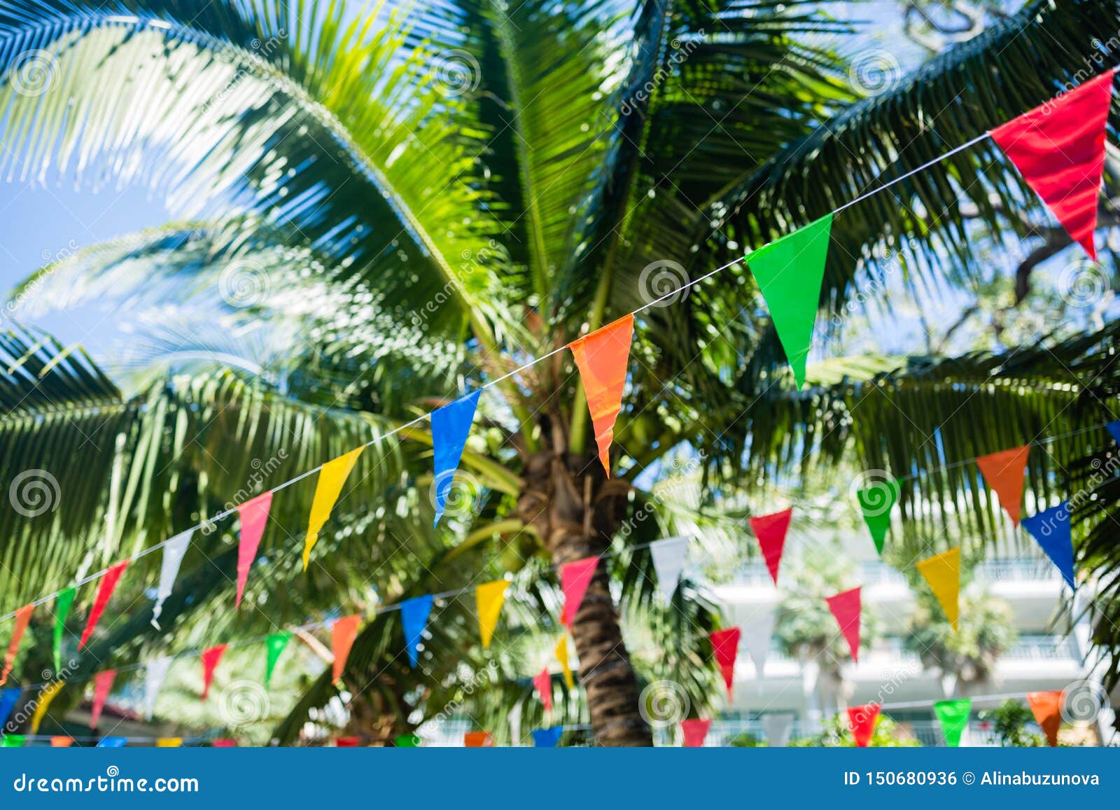 Colorful Triangle Flags Hanging on Ropes Outdoor. High Tall Pole with ...