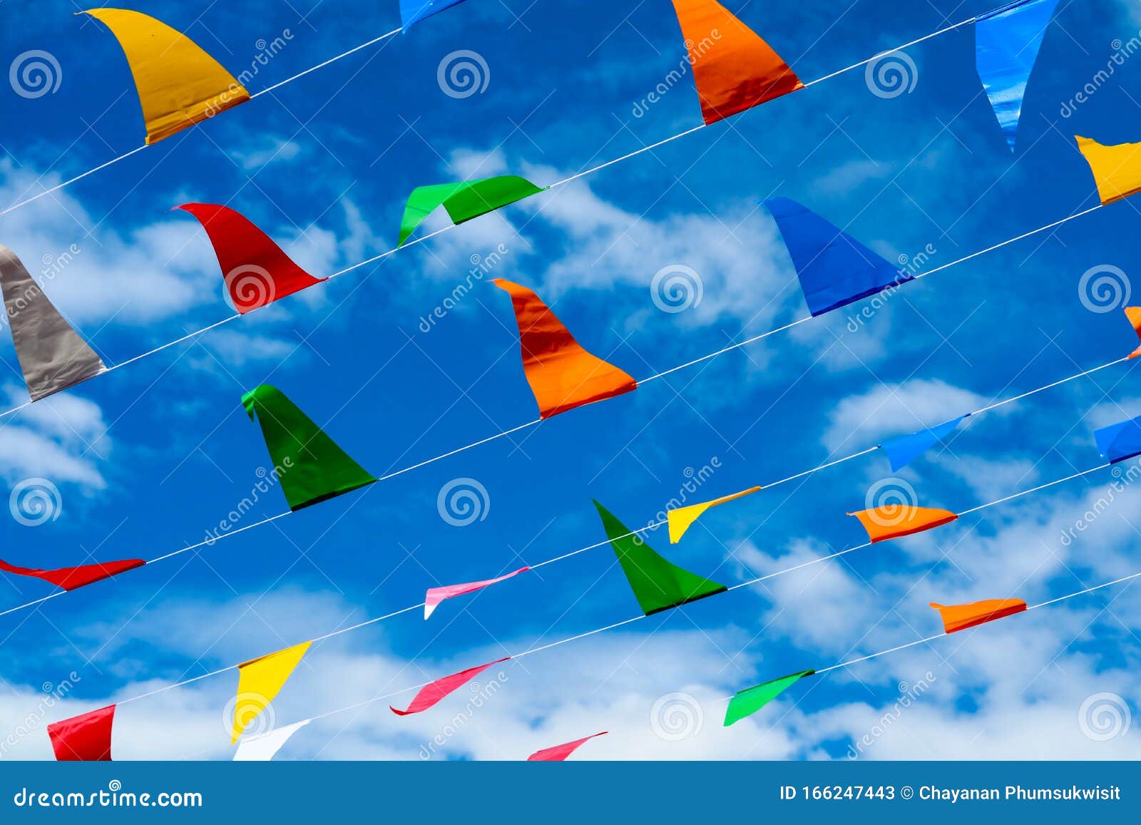 Colorful Triangular Flag Line Moving by Wind on Blue Sky White Cloud ...