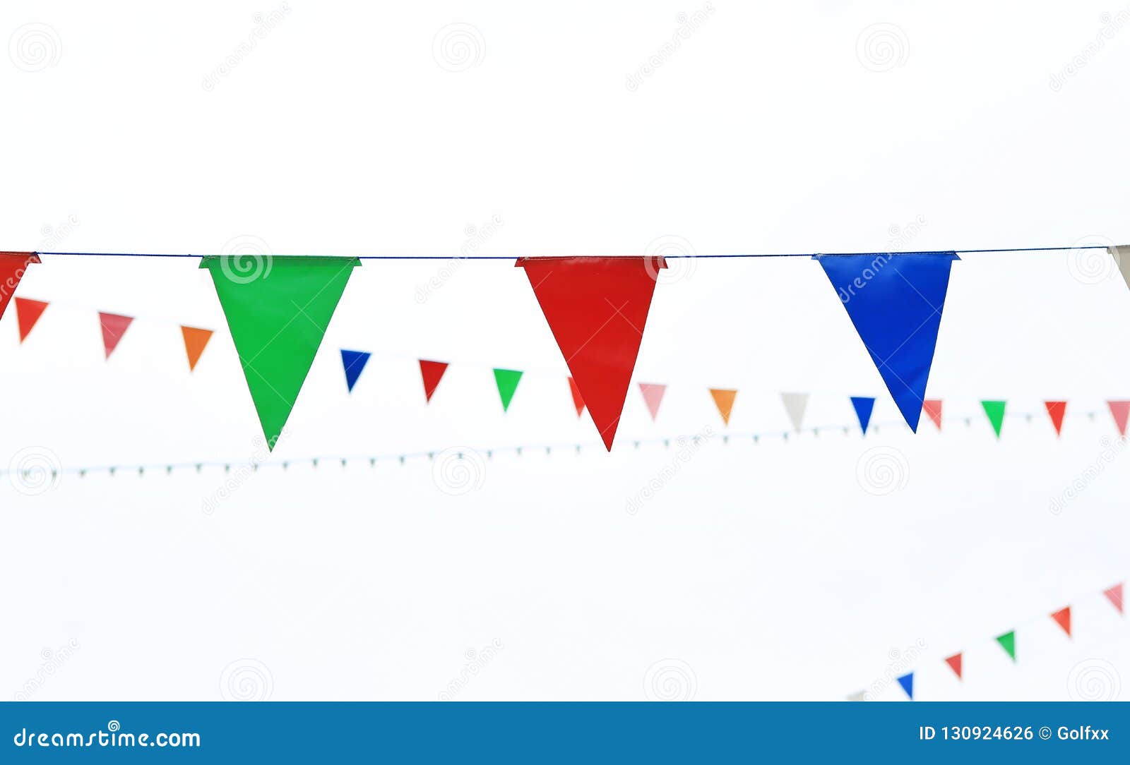 Colorful Triangular Flags Hanging in the White Sky Outdoor Stock Photo ...