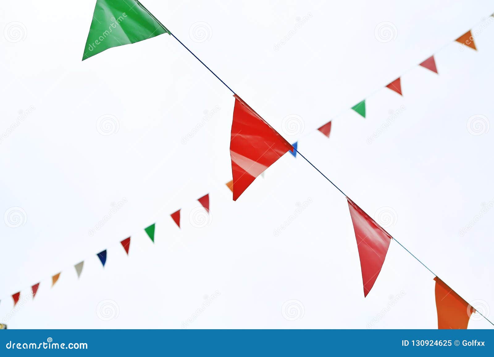Colorful Triangular Flags Hanging in the White Sky Outdoor Stock Image ...