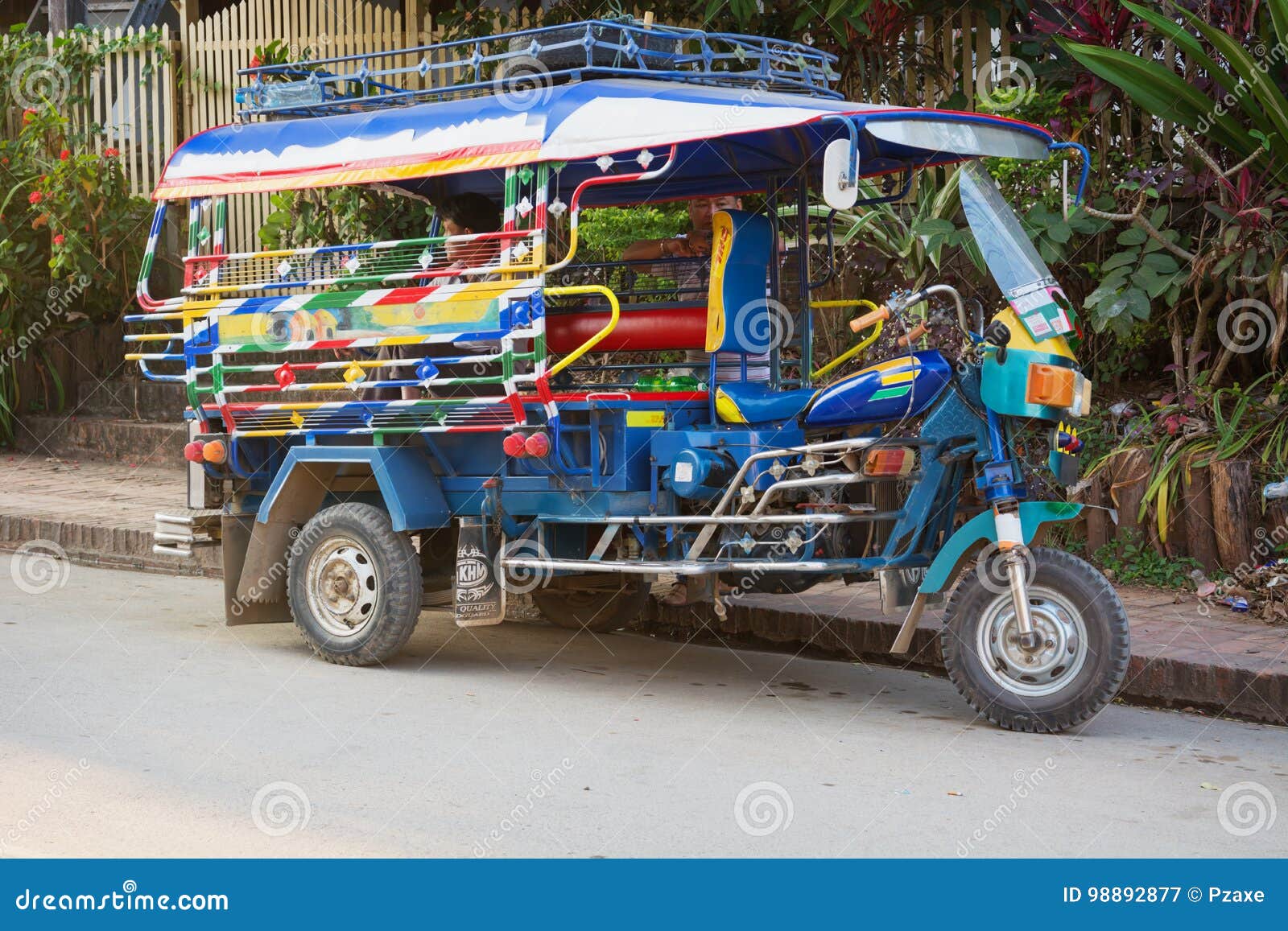 Colorful Tuk-Tuk Taxi Parked Curbside in Luang Prabang, Laos Editorial ... Colorful Tuk-Tuk Taxi Parked Curbside in Luang Prabang, Laos Editorial ...