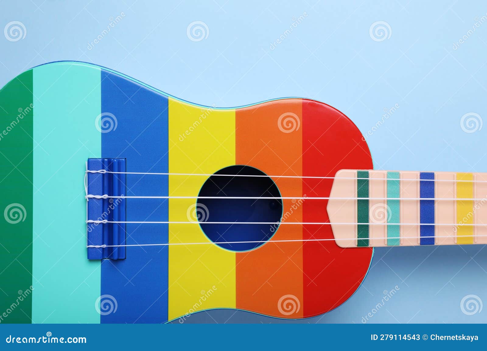 Colorful Ukulele on Light Blue Background, Top View. String Musical ...