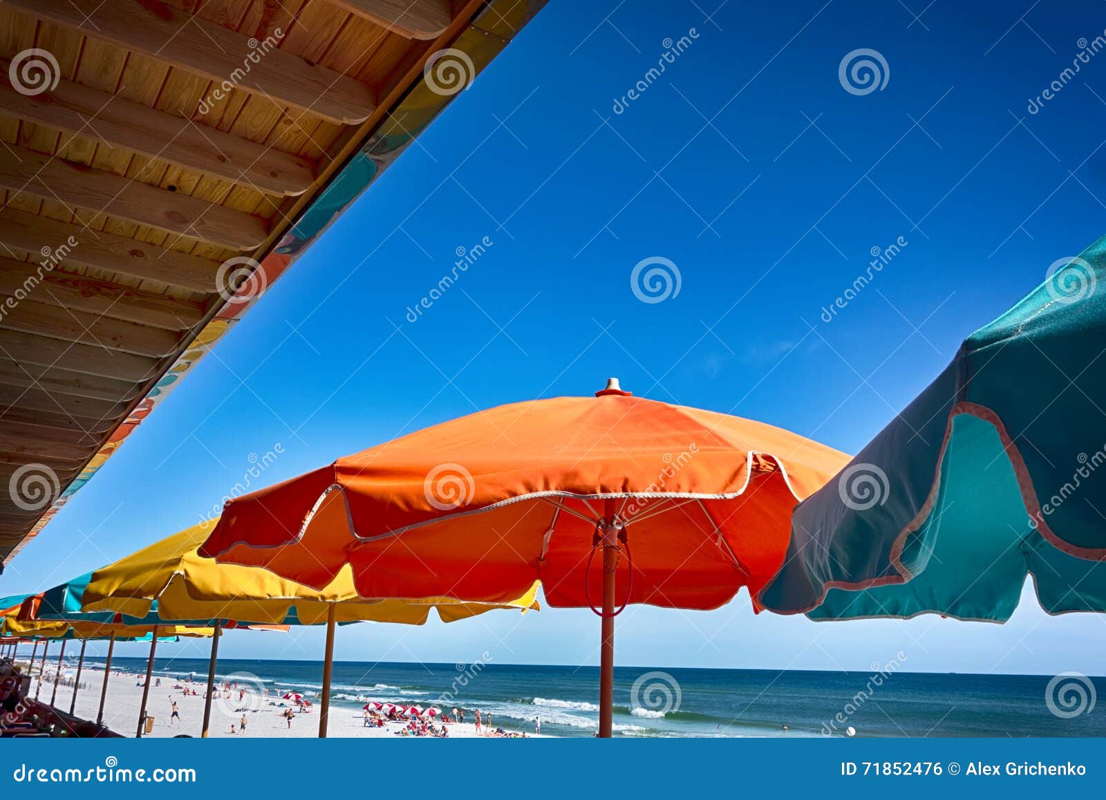 Colorful Umbrellas at a Restaurant by the Beach Stock Photo - Image of ...