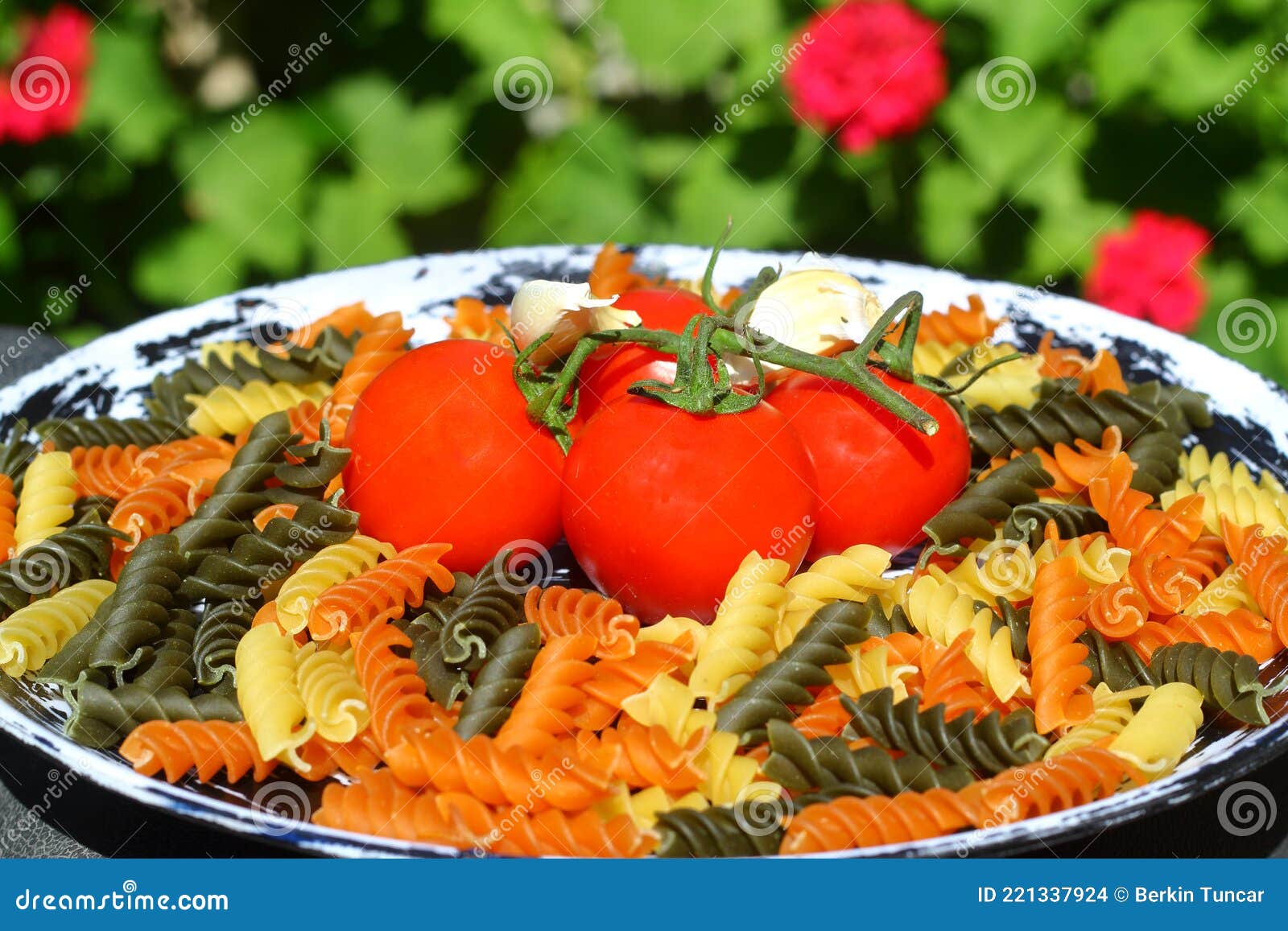 Colorful Various Raw Fusilli on Black Plate Stock Photo - Image of ...